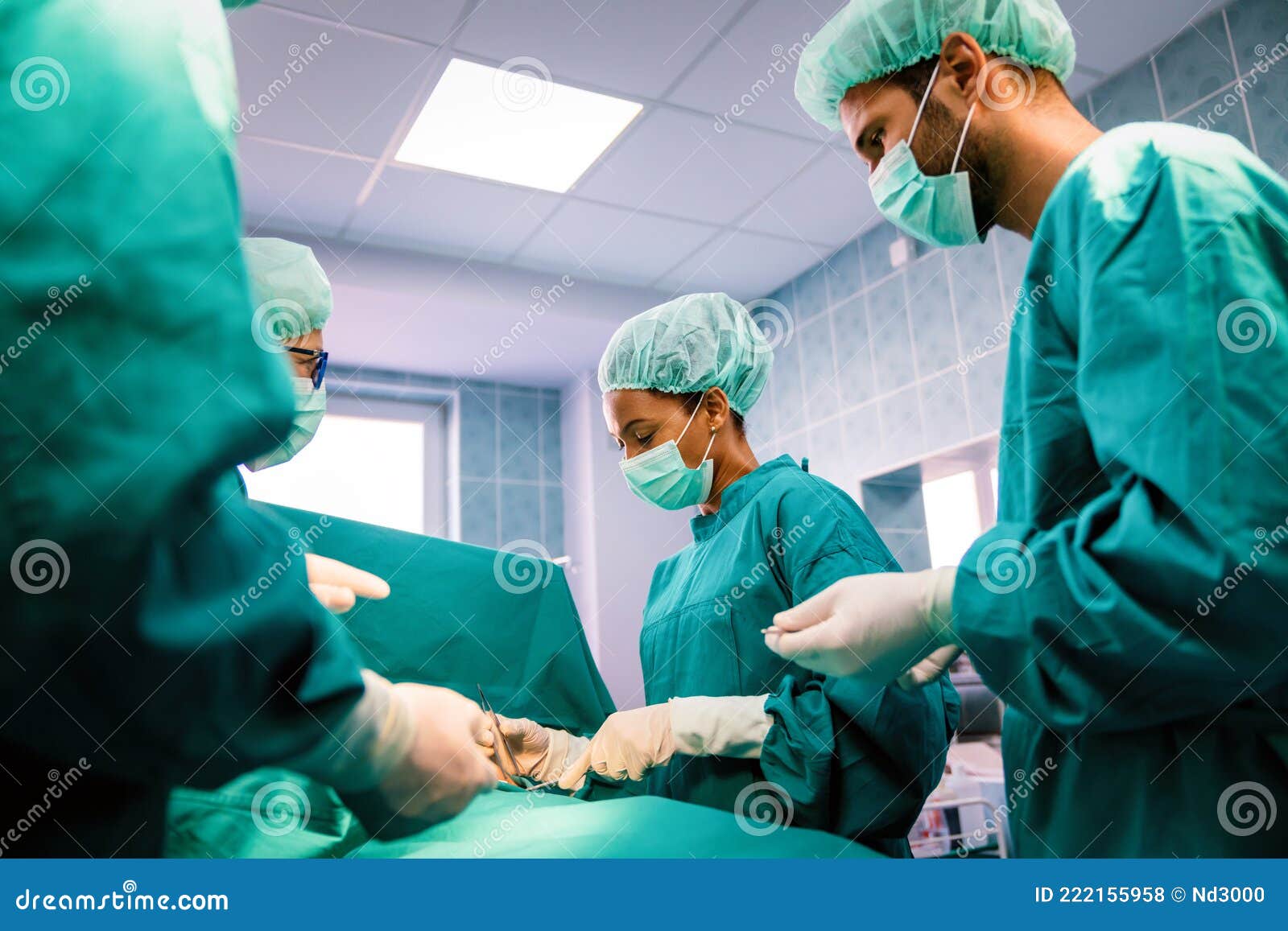 Group of Surgeon Team at Work in Operating Room in Hospital Stock Photo ...