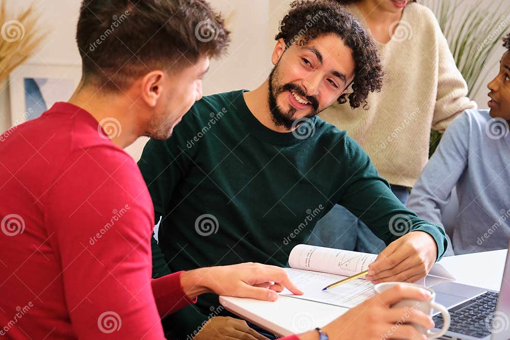 Group of Diverse University Colleagues Studying Together at Shared Flat ...