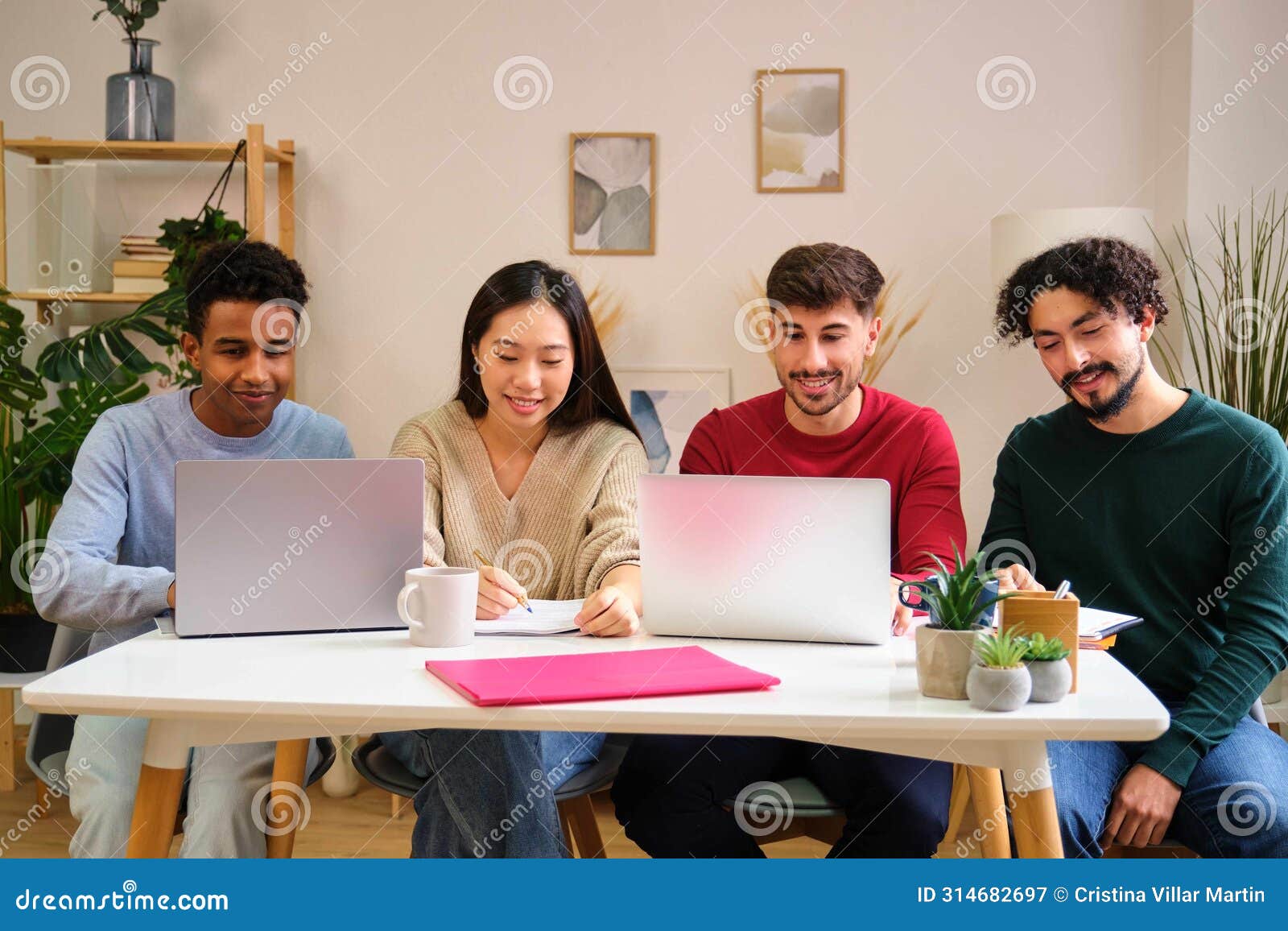 Group of Diverse University Colleagues Studying Together at Shared Flat ...