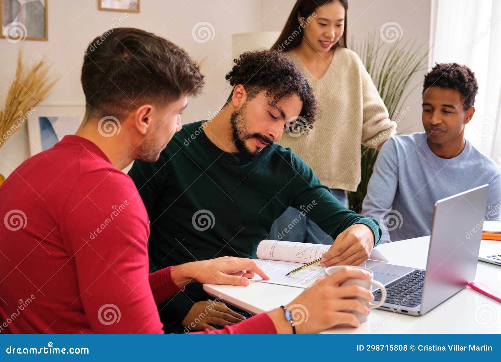 Group of Diverse University Colleagues Studying Together at Shared Flat ...