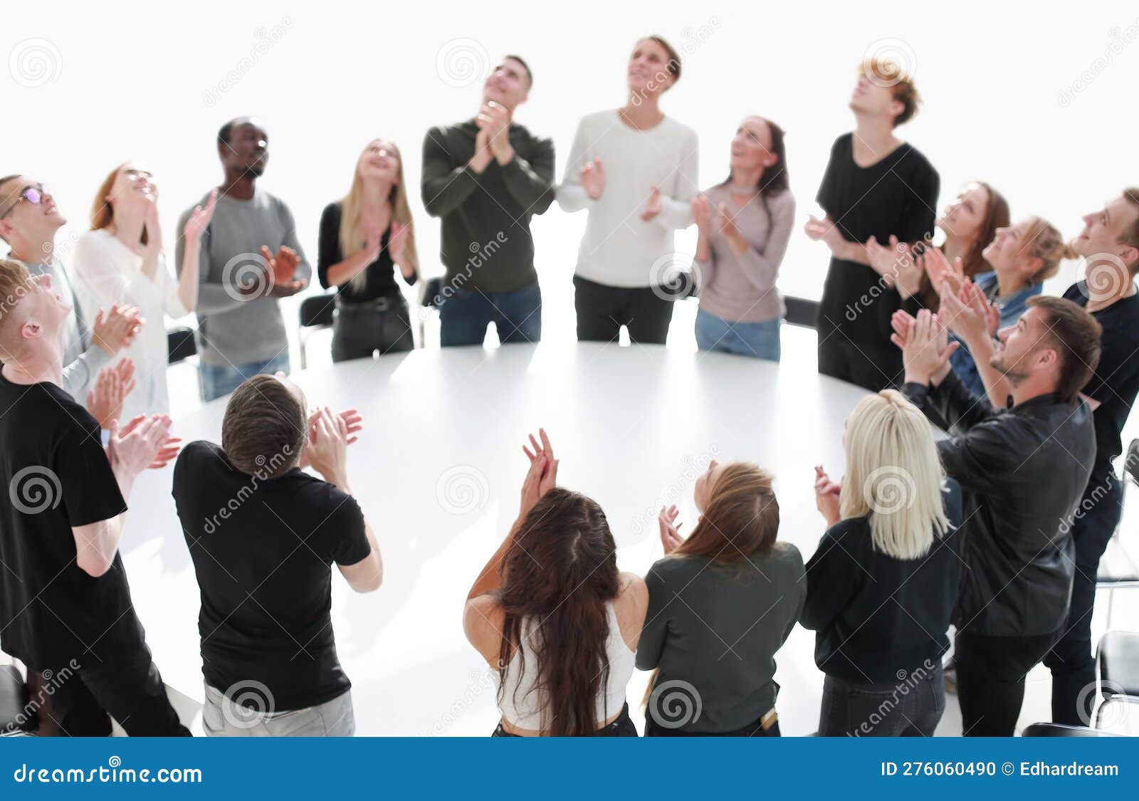 Group of Diverse Young People Standing Around a Round Table Stock Photo ...