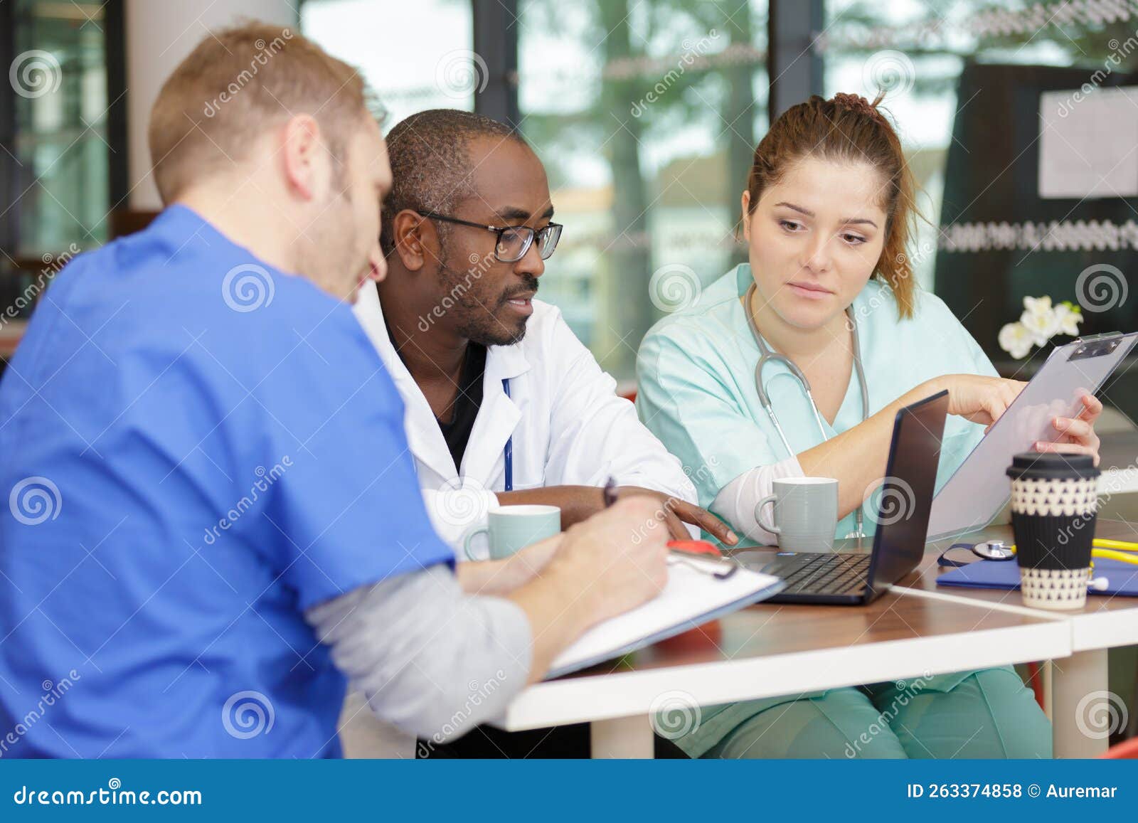Group doctors in cafeteria stock photo. Image of lunch - 263374858