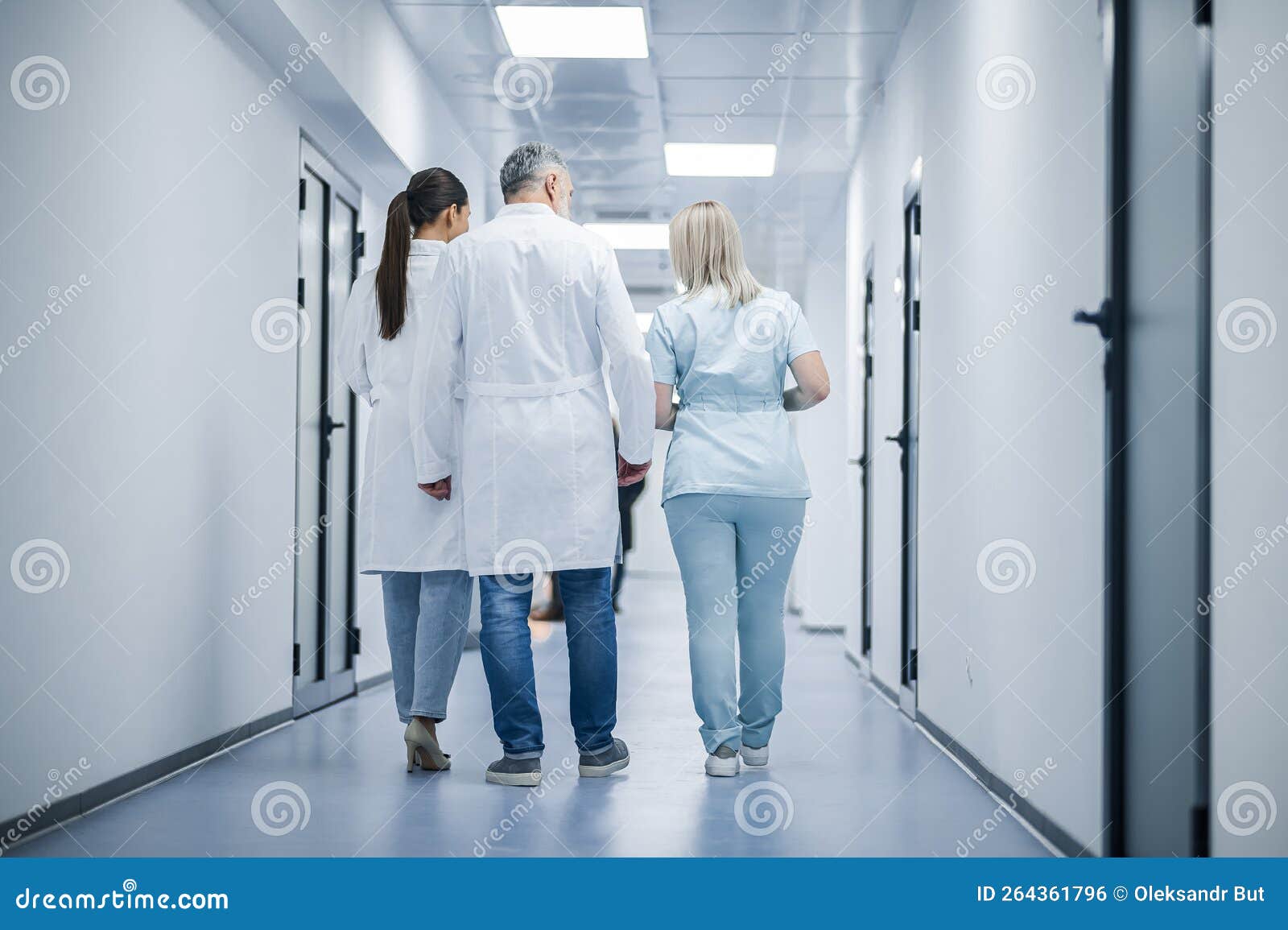 Group of Doctors in the Clinic Corridor Stock Photo - Image of indoors ...