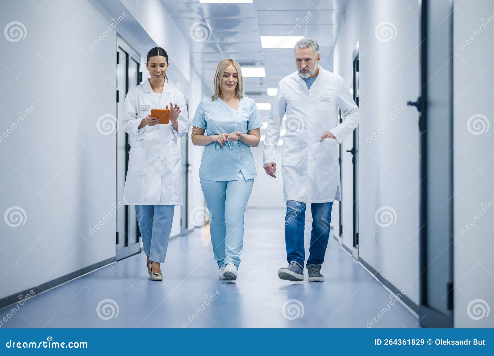 Group of Doctors in the Clinic Corridor Stock Image - Image of work ...