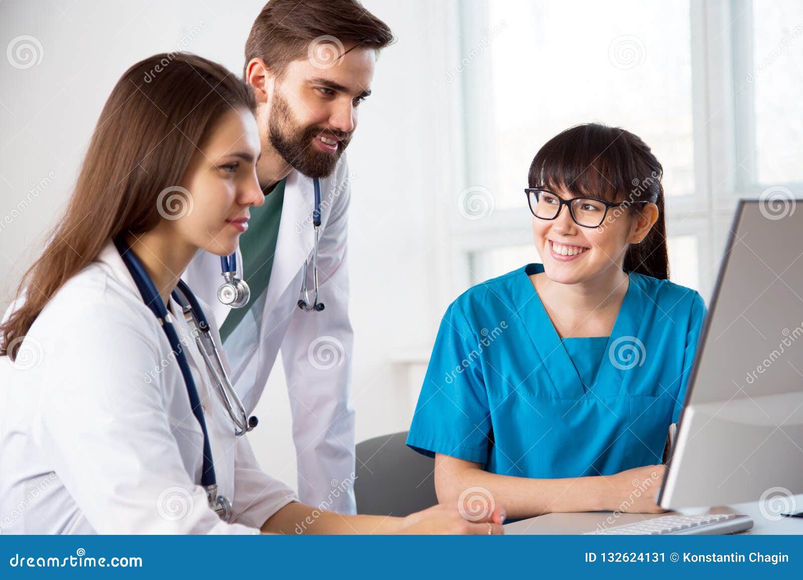 Group of Doctors in the Clinic Stock Image - Image of discussing ...