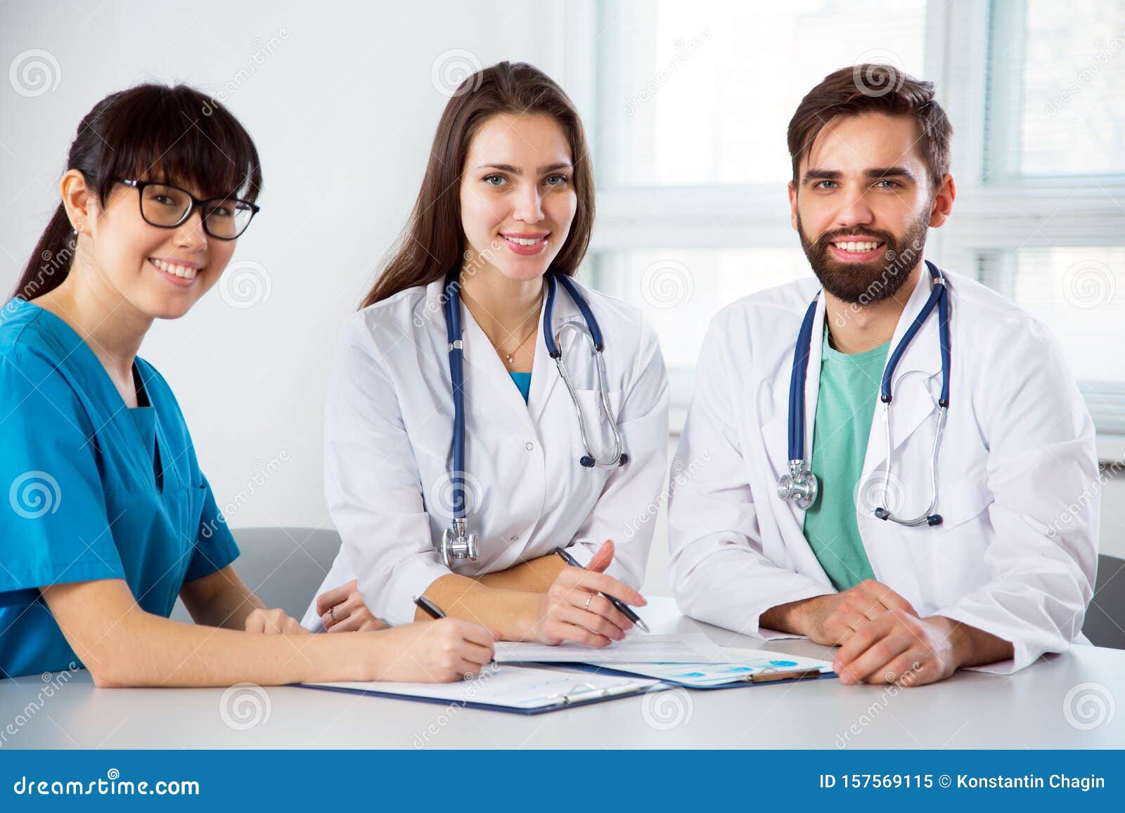 Group of Doctors Looking at Camera and Smiling Stock Image - Image of ...