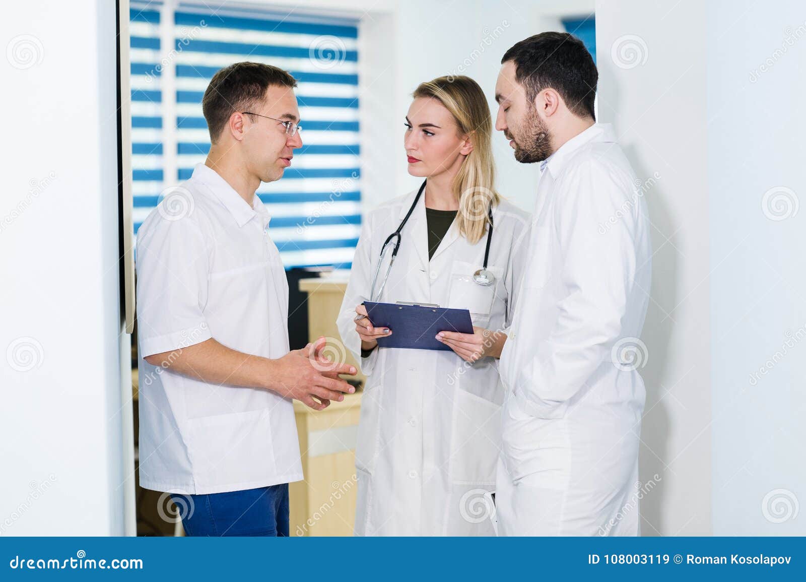 Group of Doctors Discussing and Working Together Stock Image - Image of ...