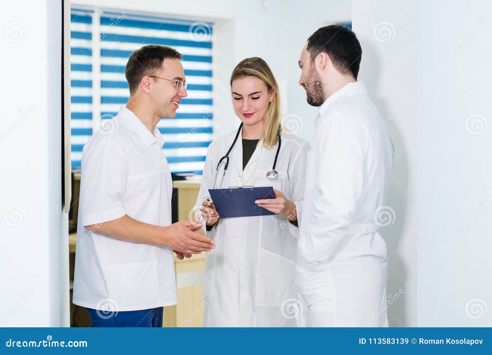 Group of Doctors Discussing and Working Together Stock Image - Image of ...