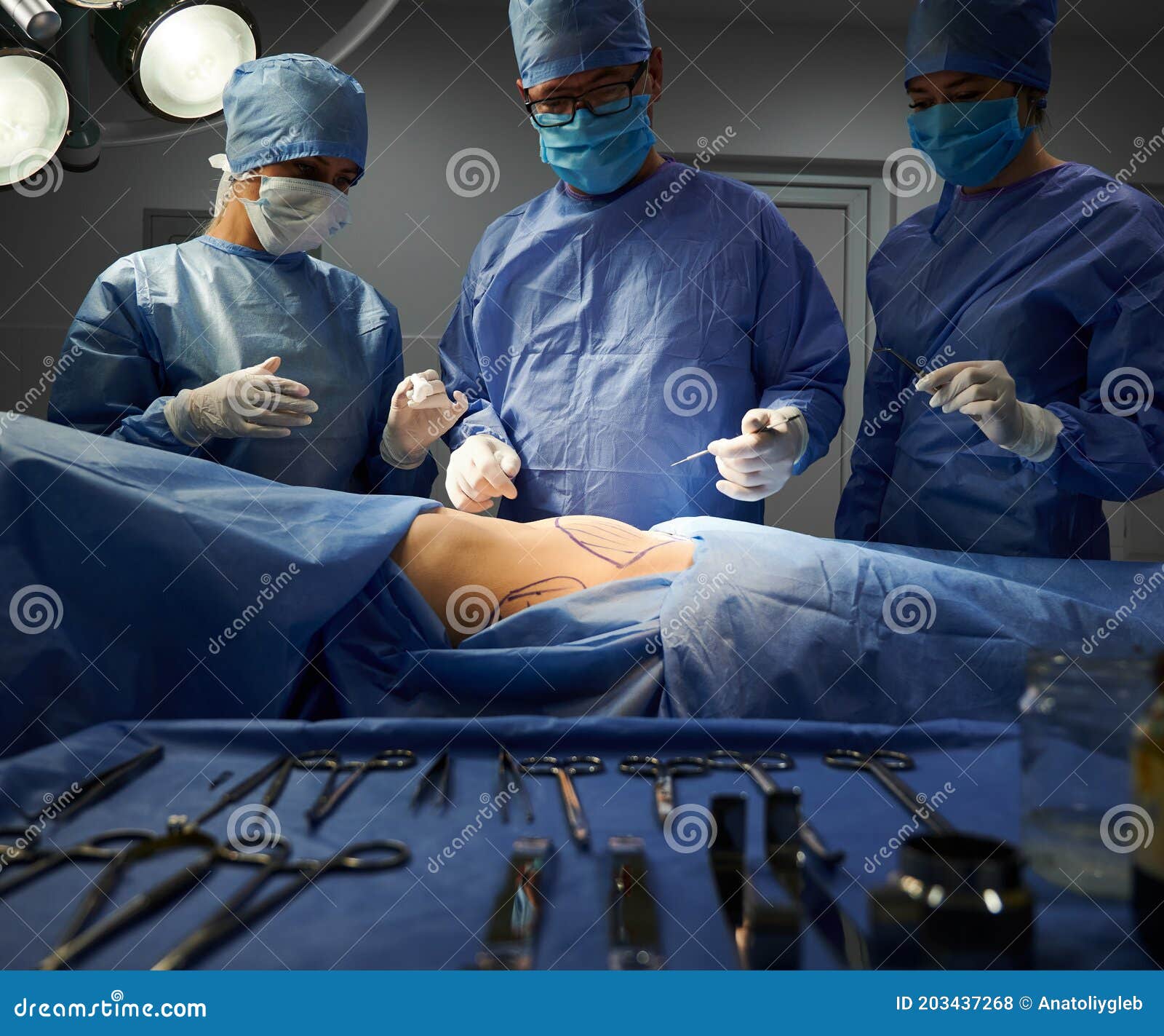 Surgical Team Standing beside Patient in Operating Room. Stock Photo ...