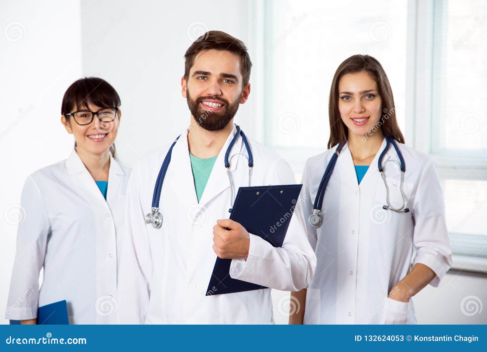 Group of Doctors Looking at Camera and Smiling Stock Image - Image of ...