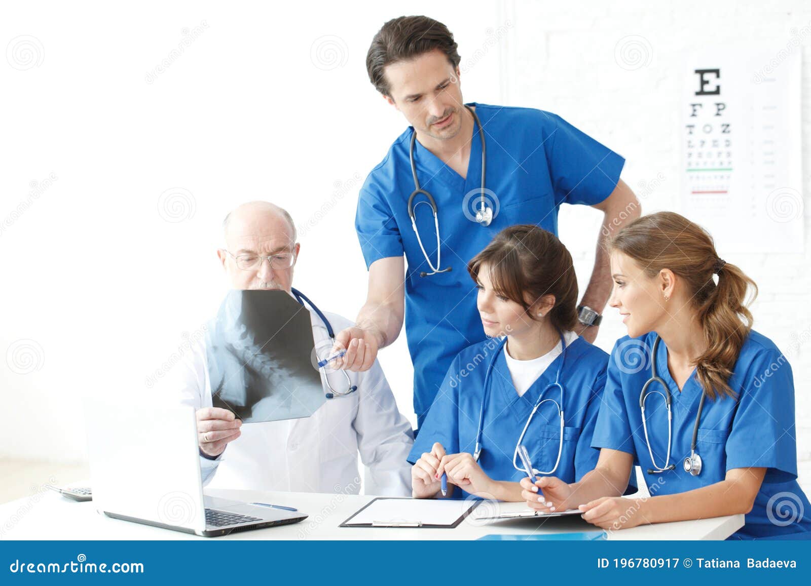 Group of Doctors Looking at X-ray Stock Image - Image of medical ...