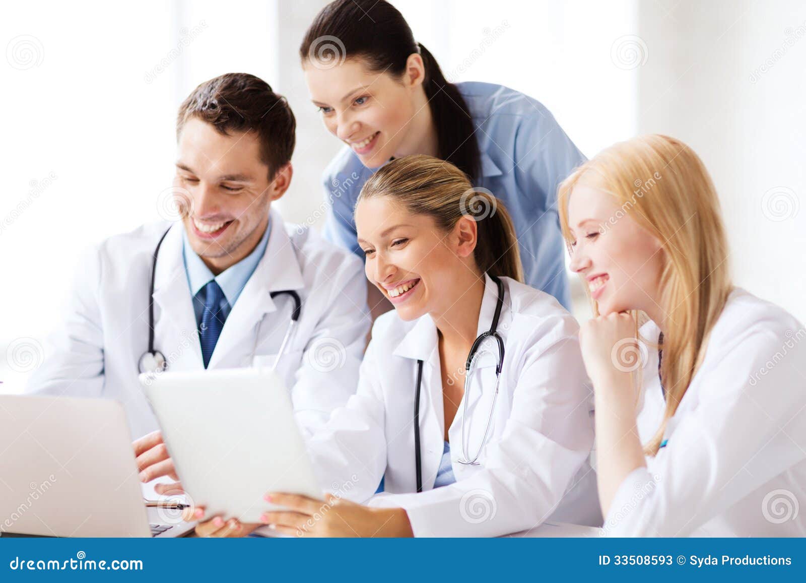 Group of Doctors Looking at Tablet Pc Stock Image - Image of cabinet ...
