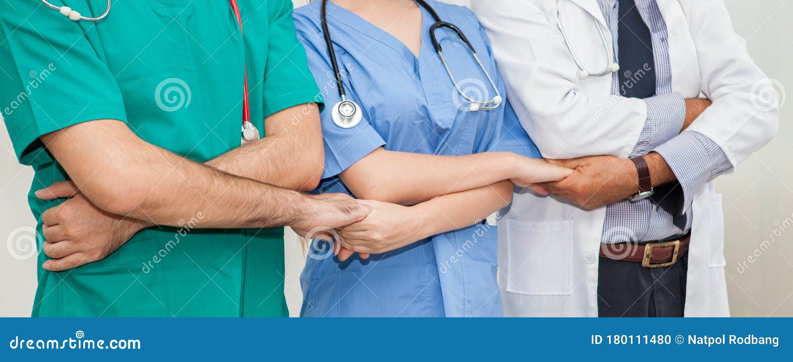 Group Of Doctors And Nurses Holding Hands Together In A Medical Team ... Group Of Doctors And Nurses Holding Hands Together In A Medical Team ...