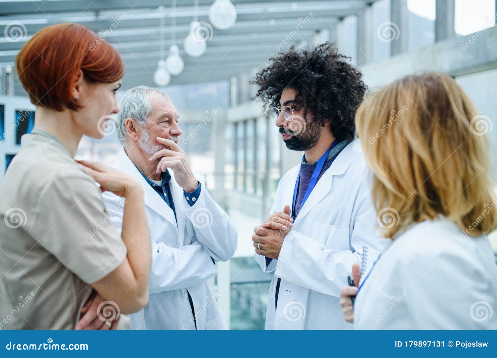 Group of Doctors Standing on Conference, Medical Team Talking. Stock ...