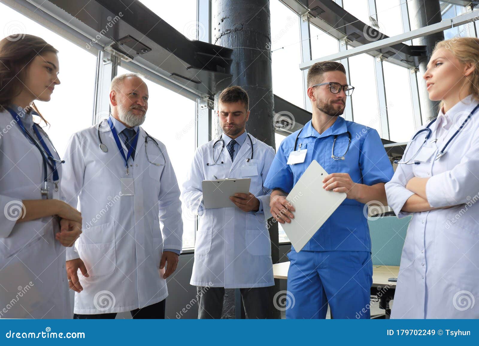 Group of Doctors Standing at the Medical Office Stock Image - Image of ...