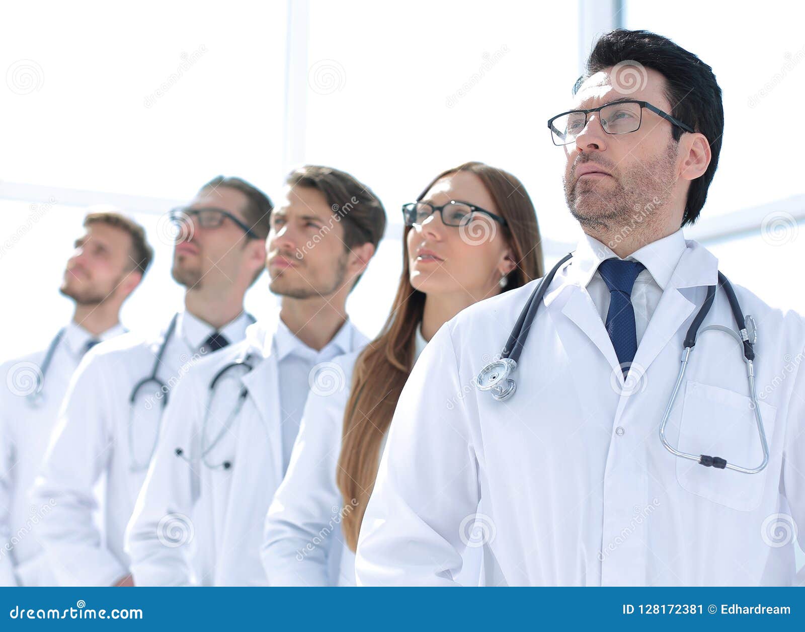 Group of Doctors Standing in a Row and Looking at a Copy Space Stock ...