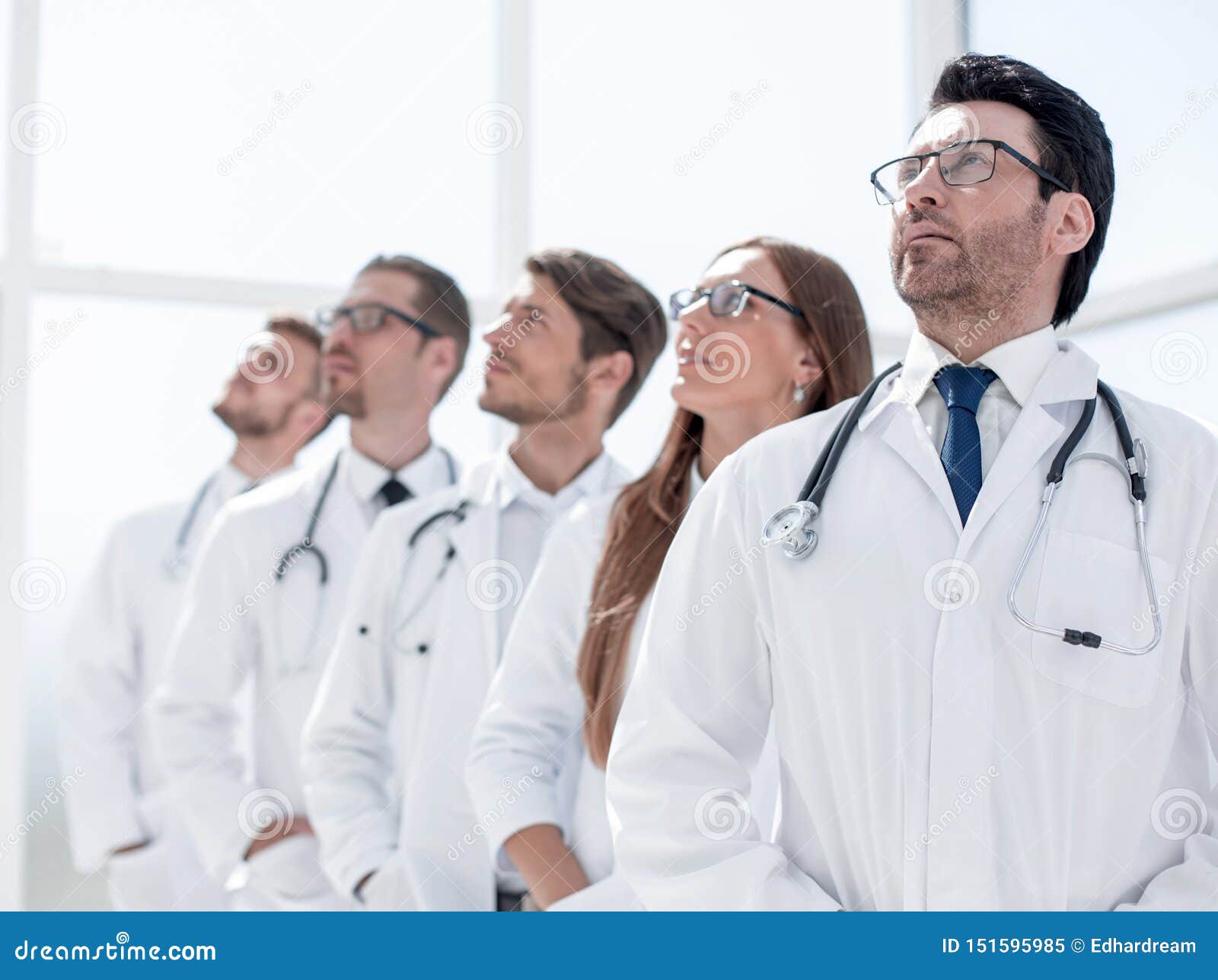Group of Doctors Standing in a Row and Looking at a Copy Space Stock ...