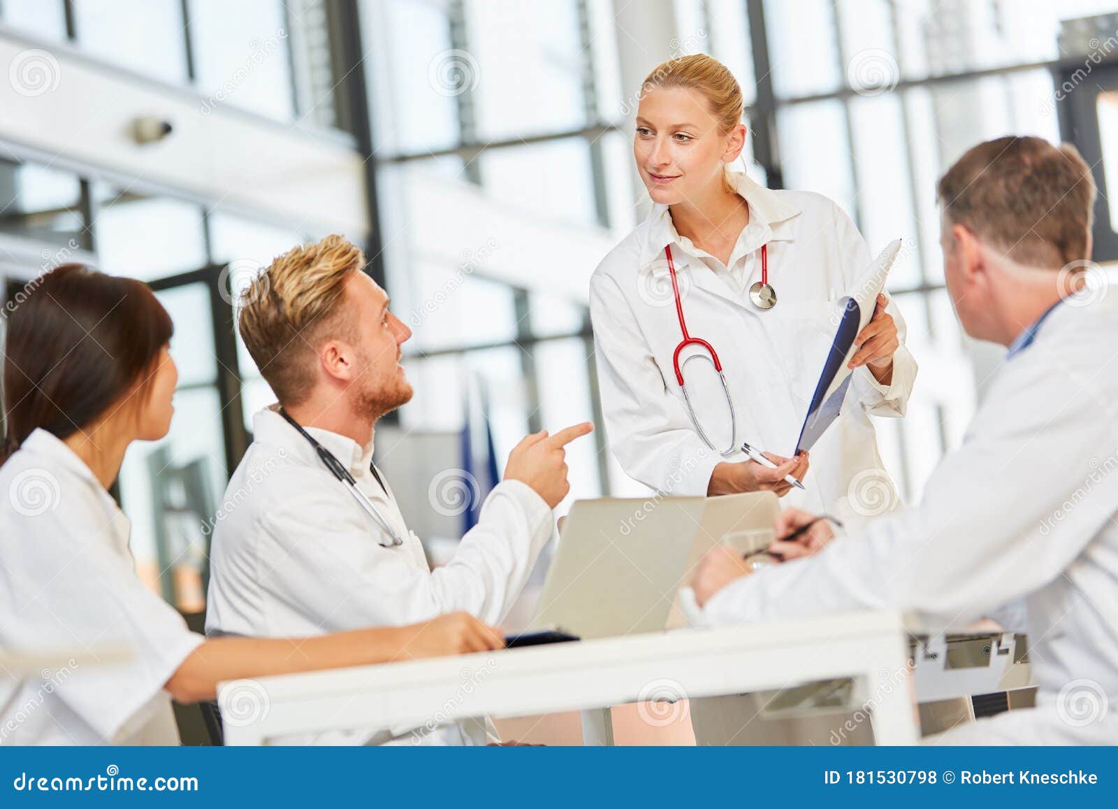 Group Doctors at a Team Meeting Stock Photo - Image of talk, healthcare ...