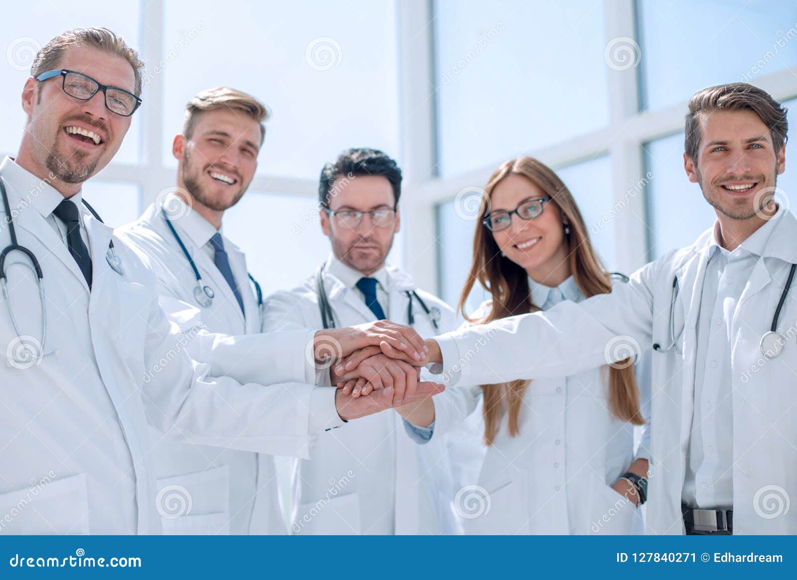 Group of Doctors with Their Hands Folded Together Stock Image - Image ... Group of Doctors with Their Hands Folded Together Stock Image - Image ...