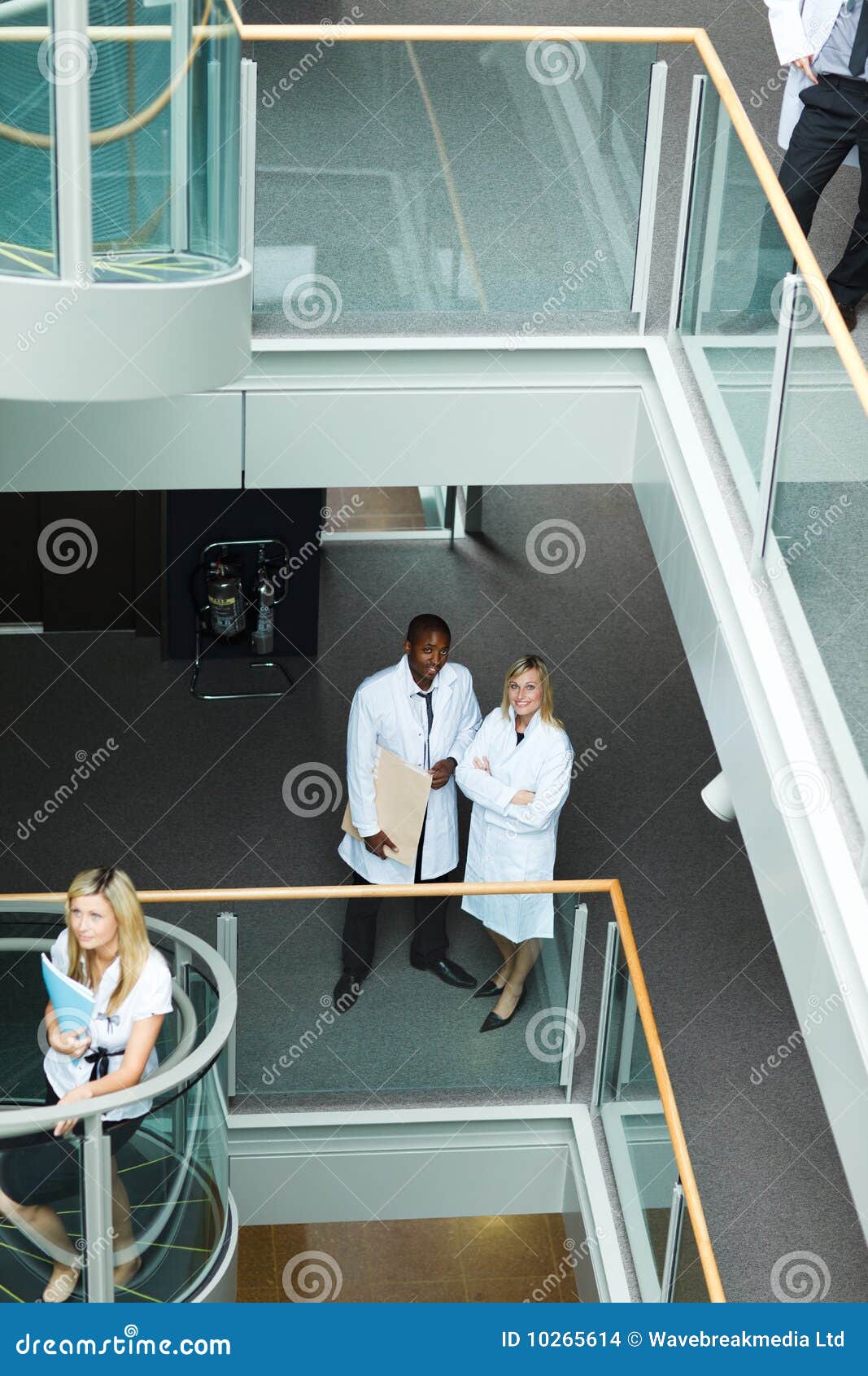 Group of Doctors Walking in Hospital Stock Photo - Image of afro ...