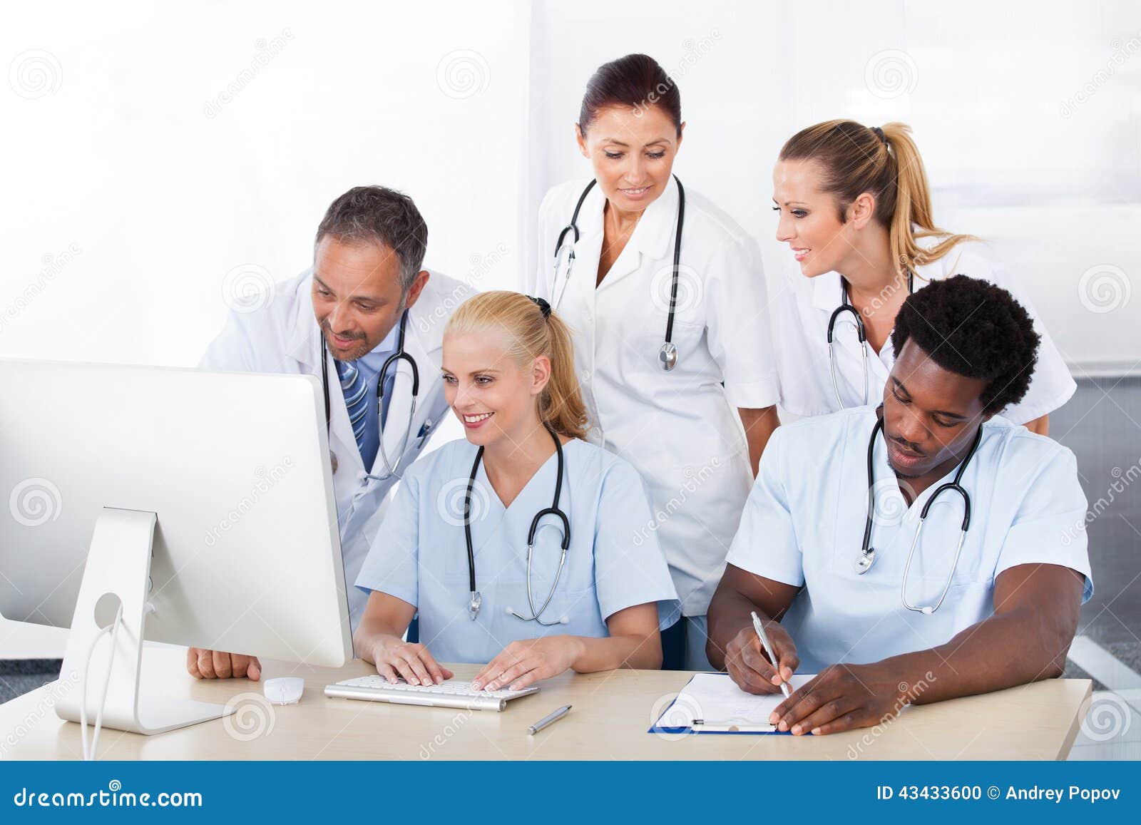 Group Of Doctors Working Together Stock Photo - Image of joyful ...