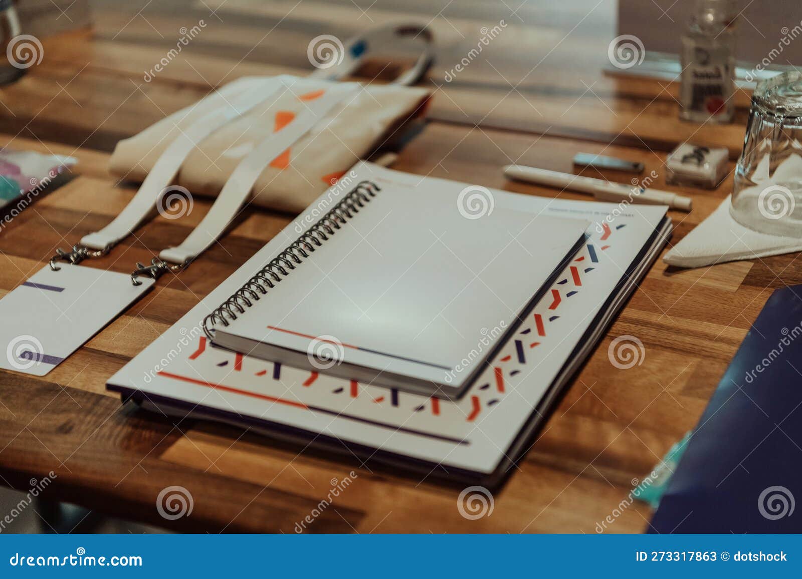 A Group of Documents and a Schedule on the Table Prepared for the ...