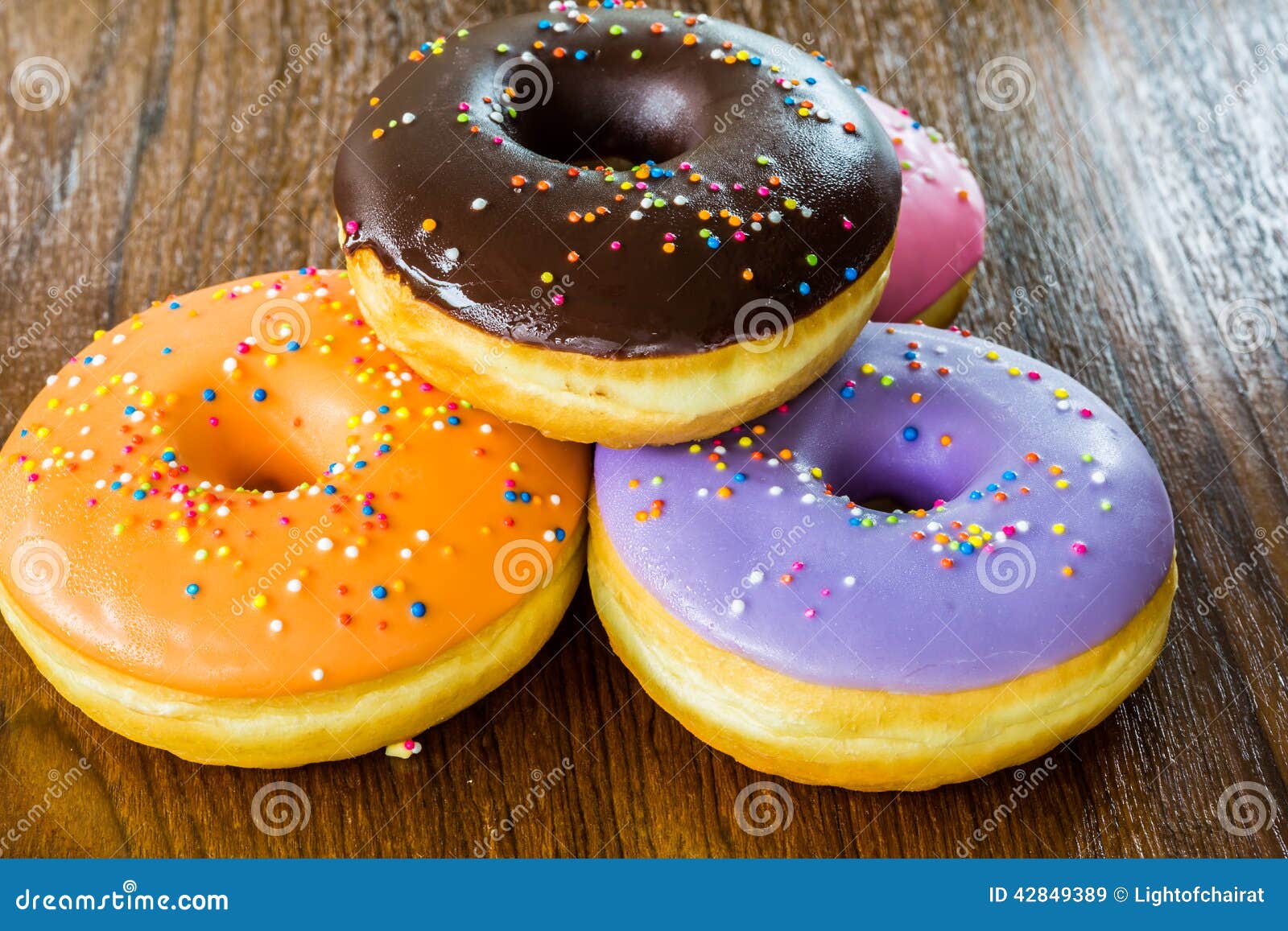 Group of donuts on wood stock image. Image of glazed - 42849389