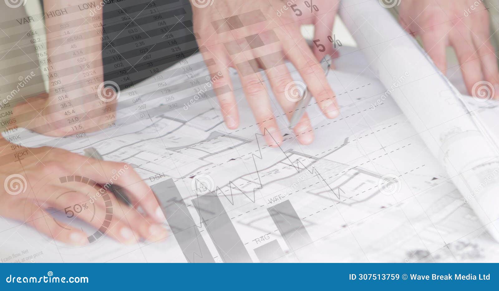 Group Drafting Plans with Graphs and Stats in the Foreground Stock ...