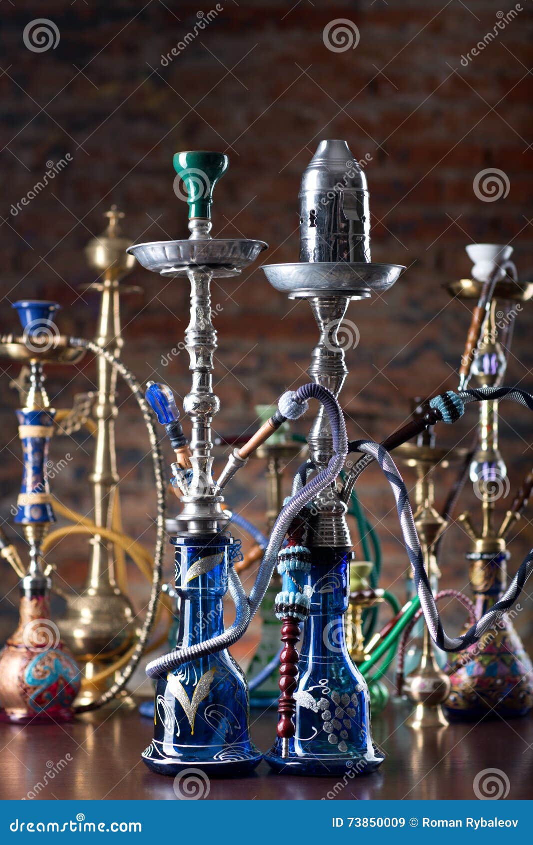 Group of Eastern Hookahs on Wood Table Stock Image - Image of marijuana ...