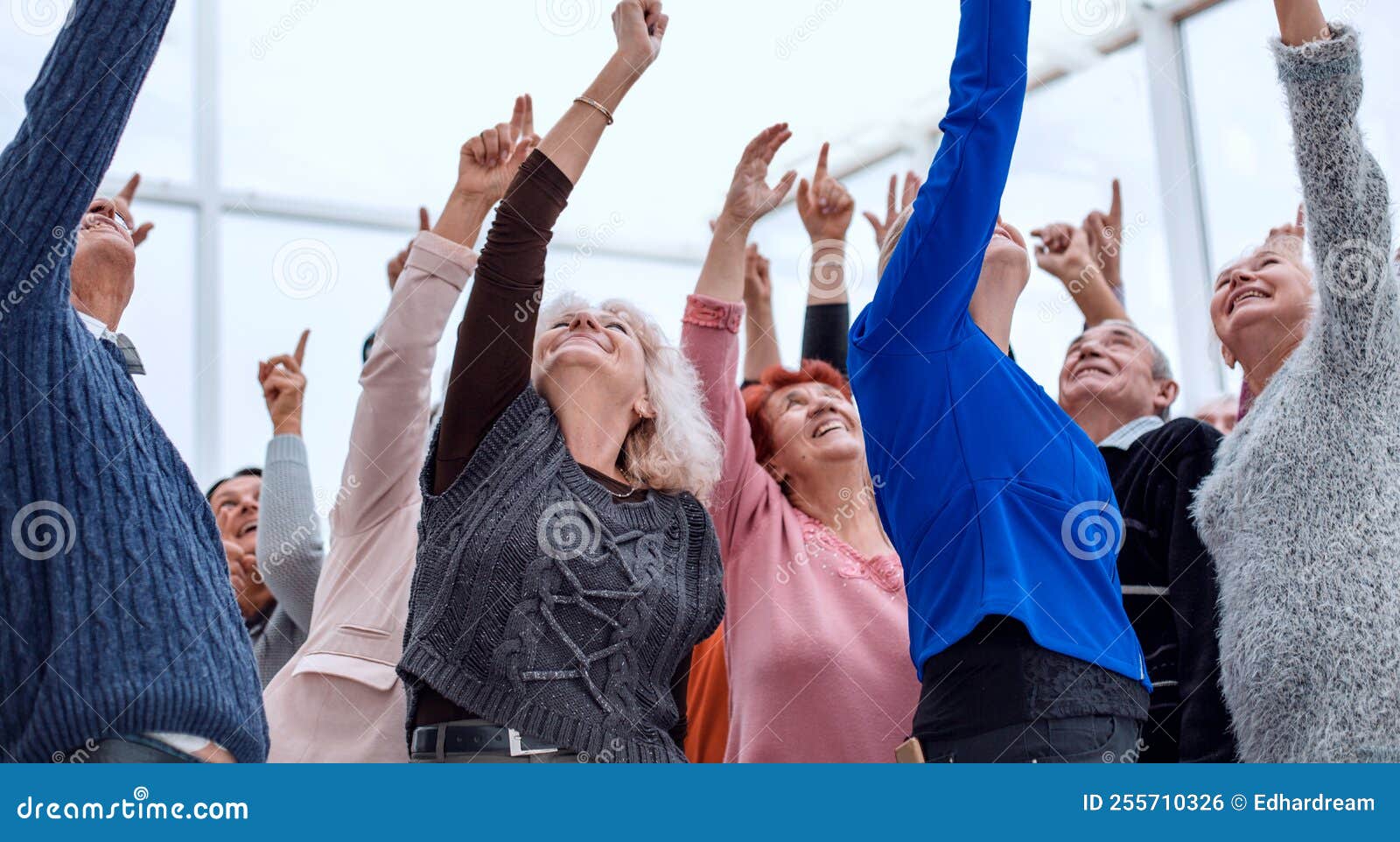 A Group of Elderly People are Reaching Up Stock Photo - Image of look ...
