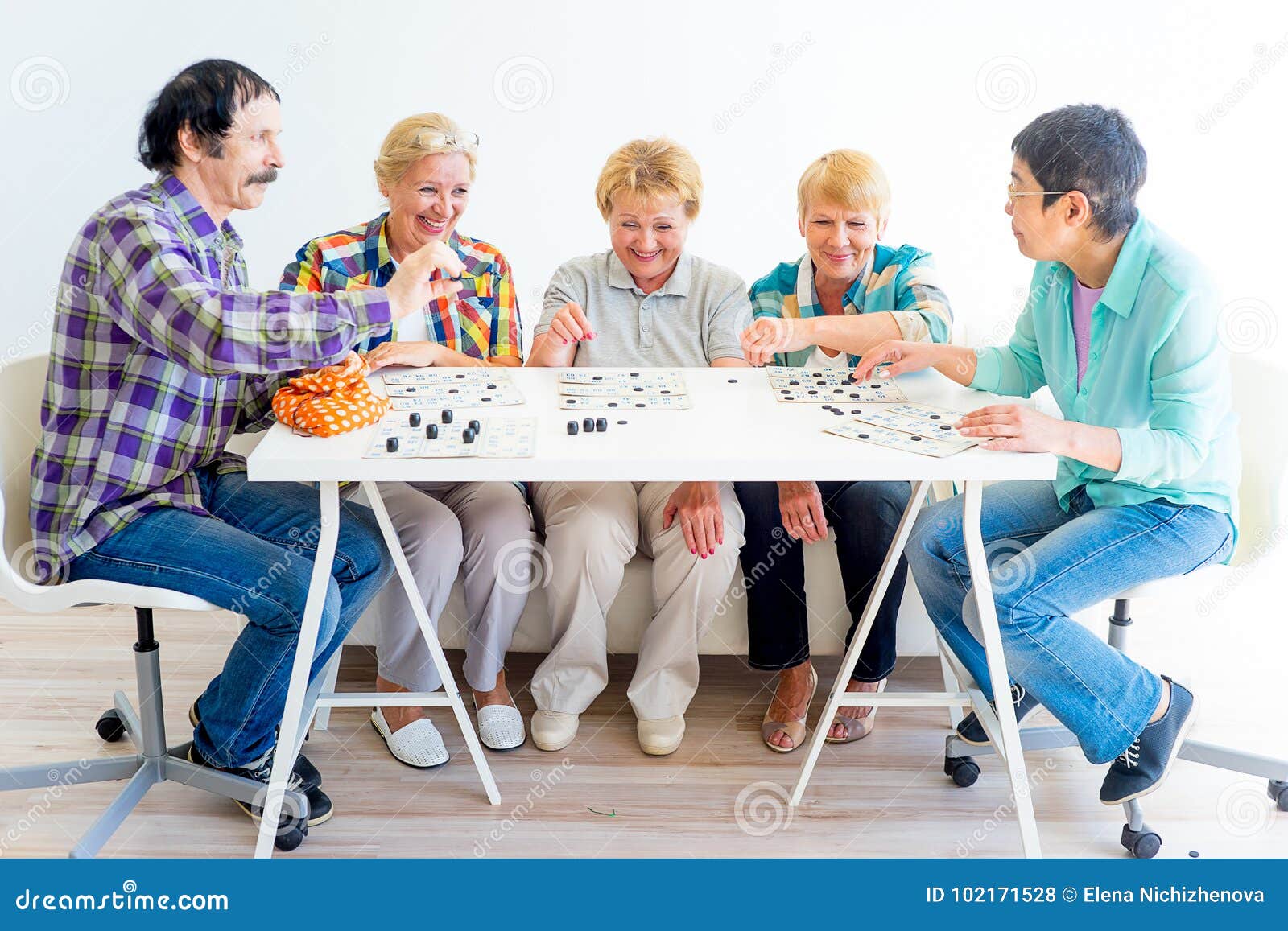 Seniors playing bingo stock photo. Image of leisure - 102171528