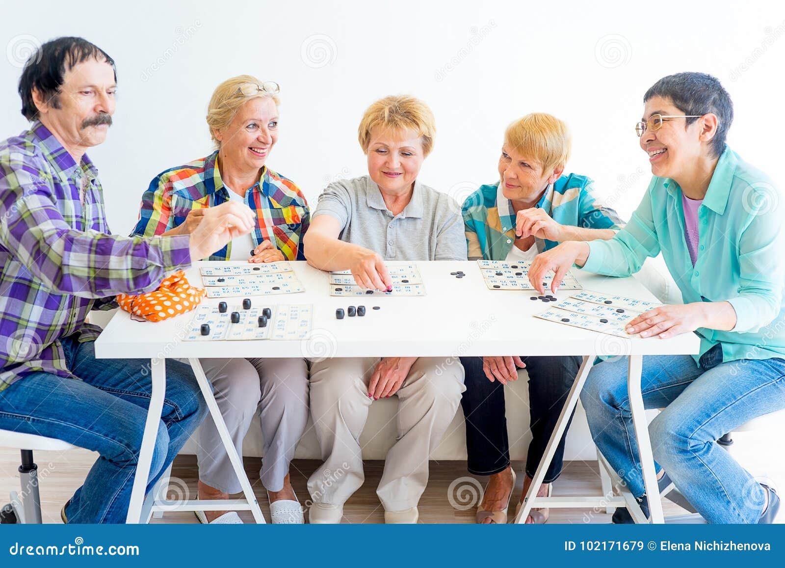 Seniors playing bingo stock image. Image of caucasian - 102171679