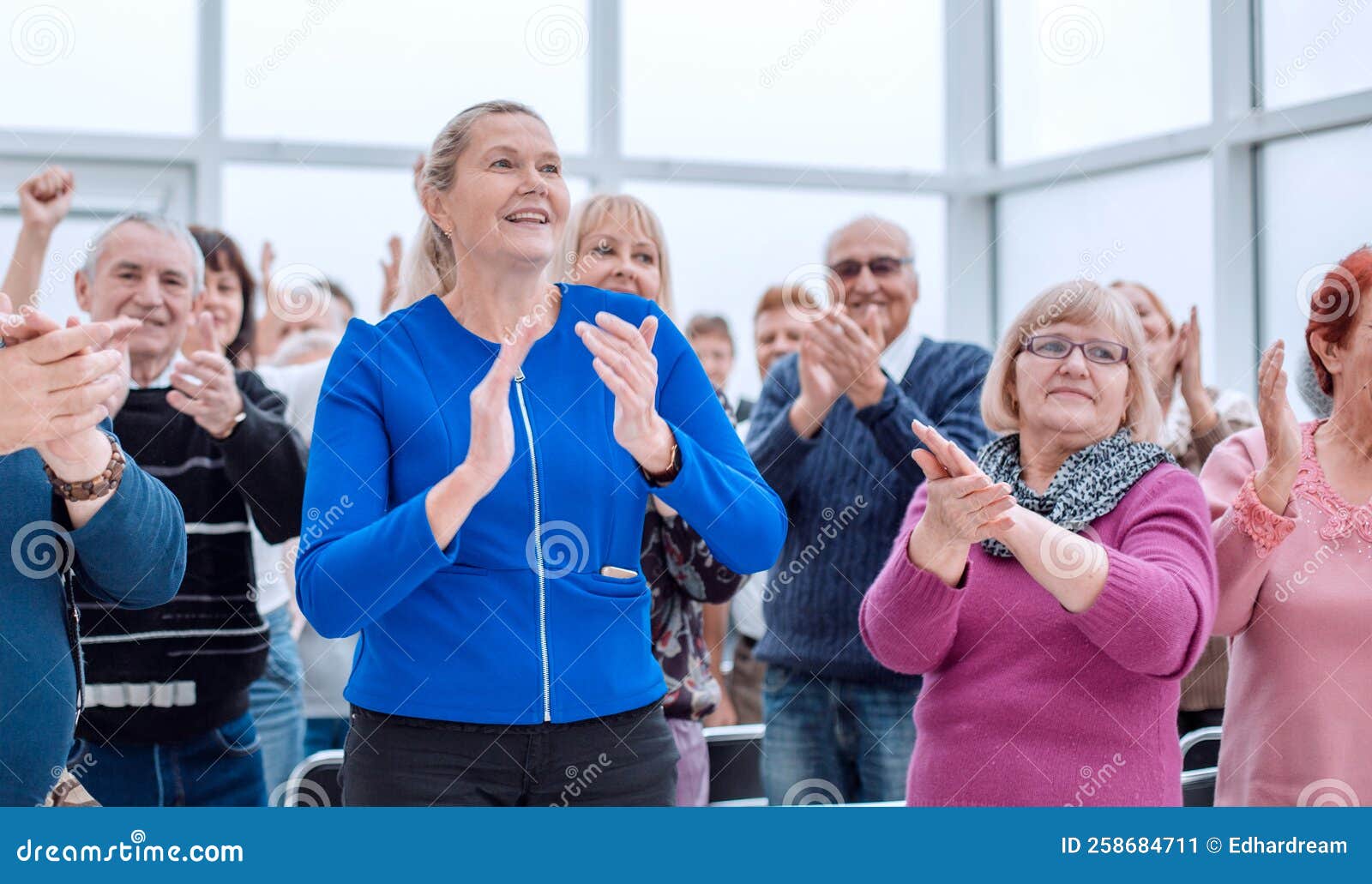 A Group of Elderly People are Sitting in a Circle Clapping Their Stock ...