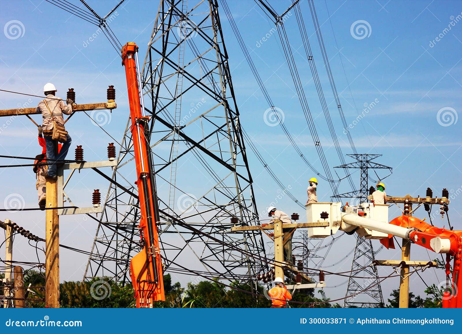 Electric Worker Team Changing High Voltage Transmission Lines On Pole ...