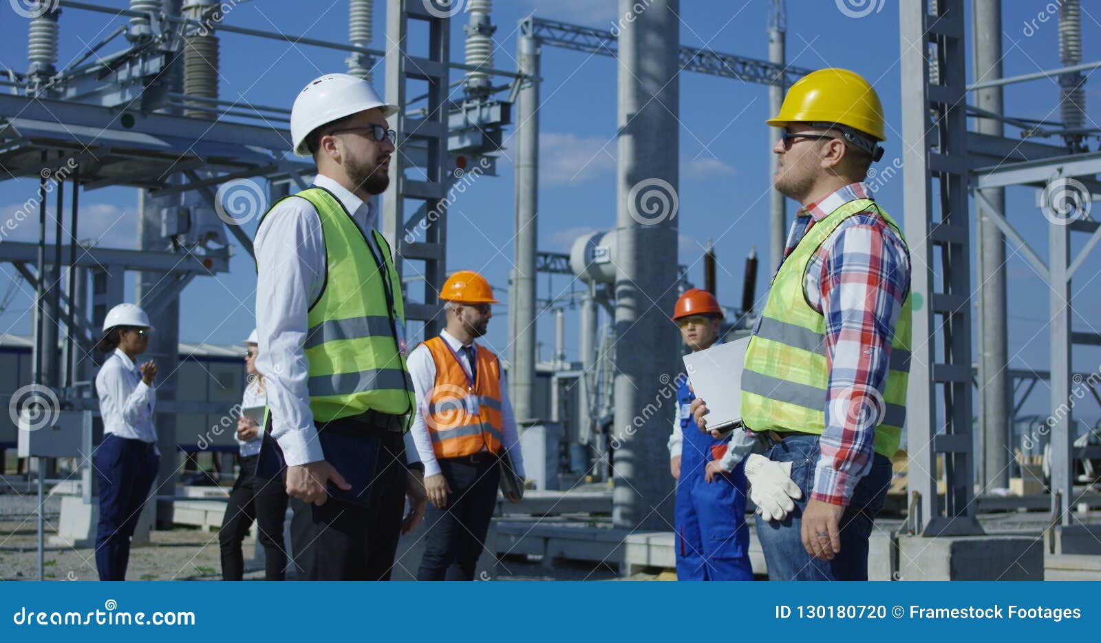 A Group of Electrical Workers Stock Photo - Image of outdoors ...