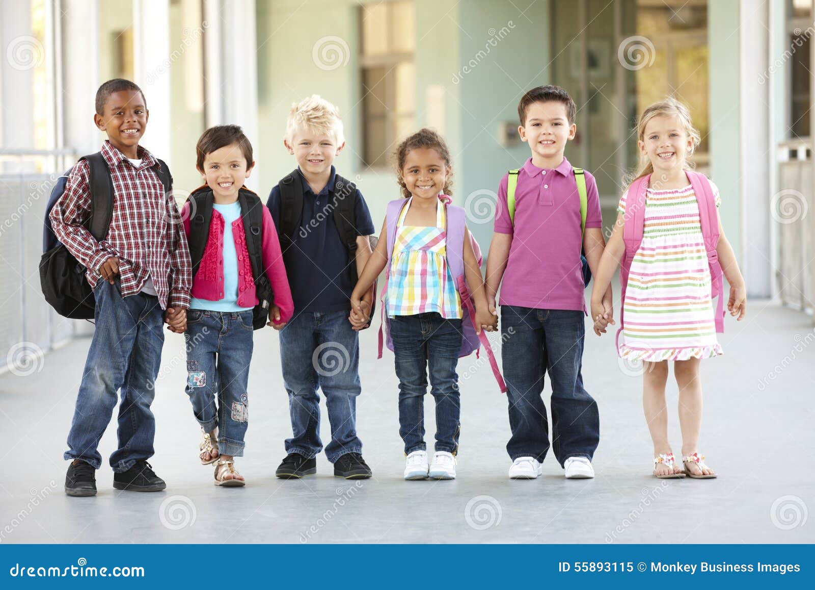 Group of Elementary Age Schoolchildren Standing Outside Stock Image ...