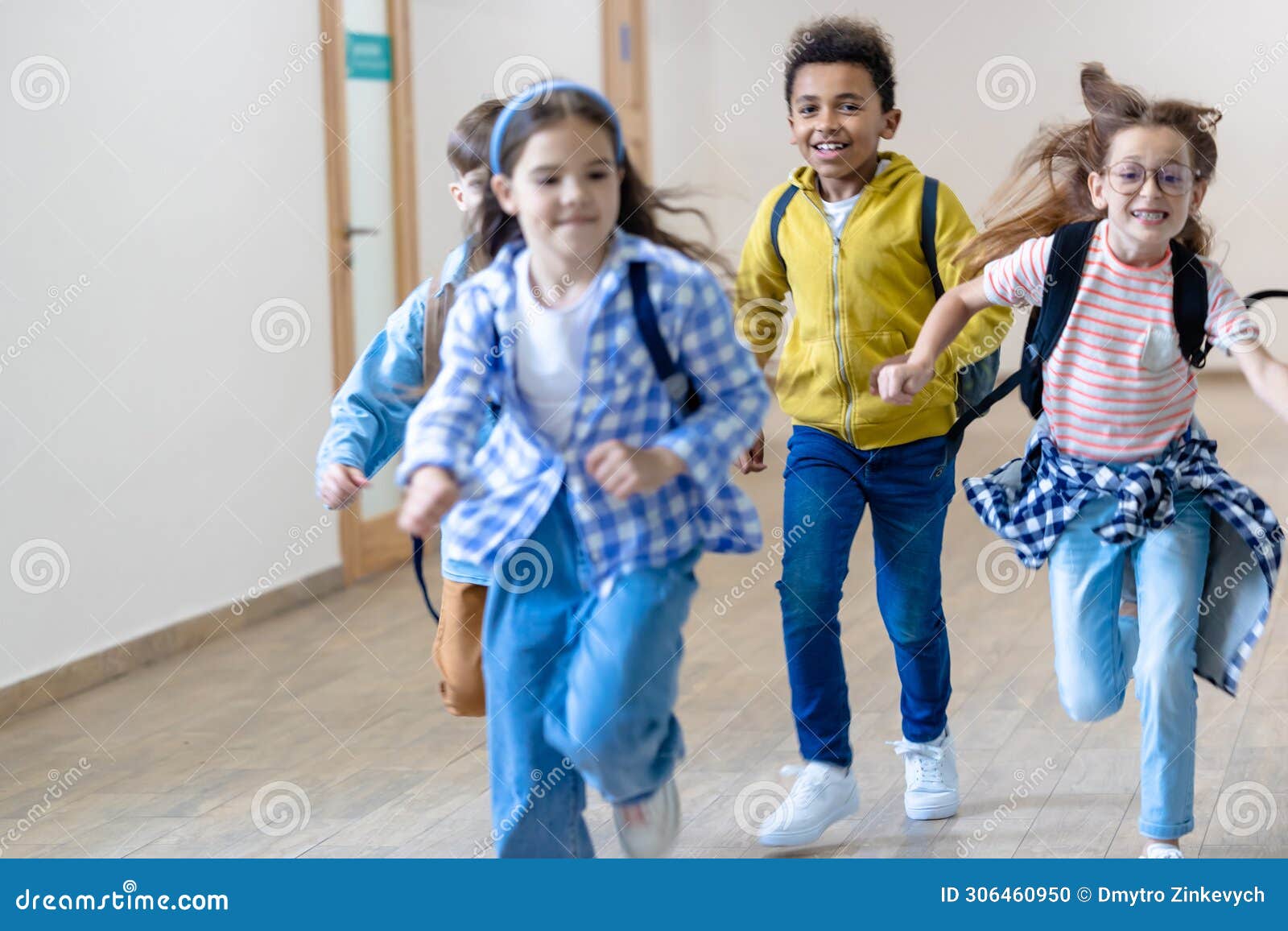 Group of Elementary School Kids Running in School Corridor. Stock Photo ...