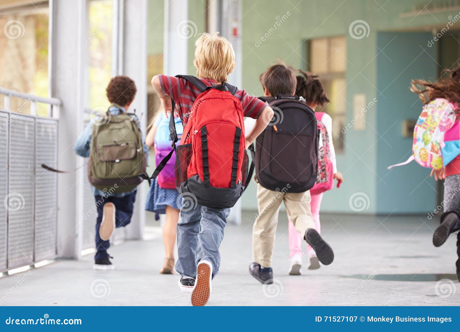 Group of Elementary School Kids Running at School, Back View Stock ...