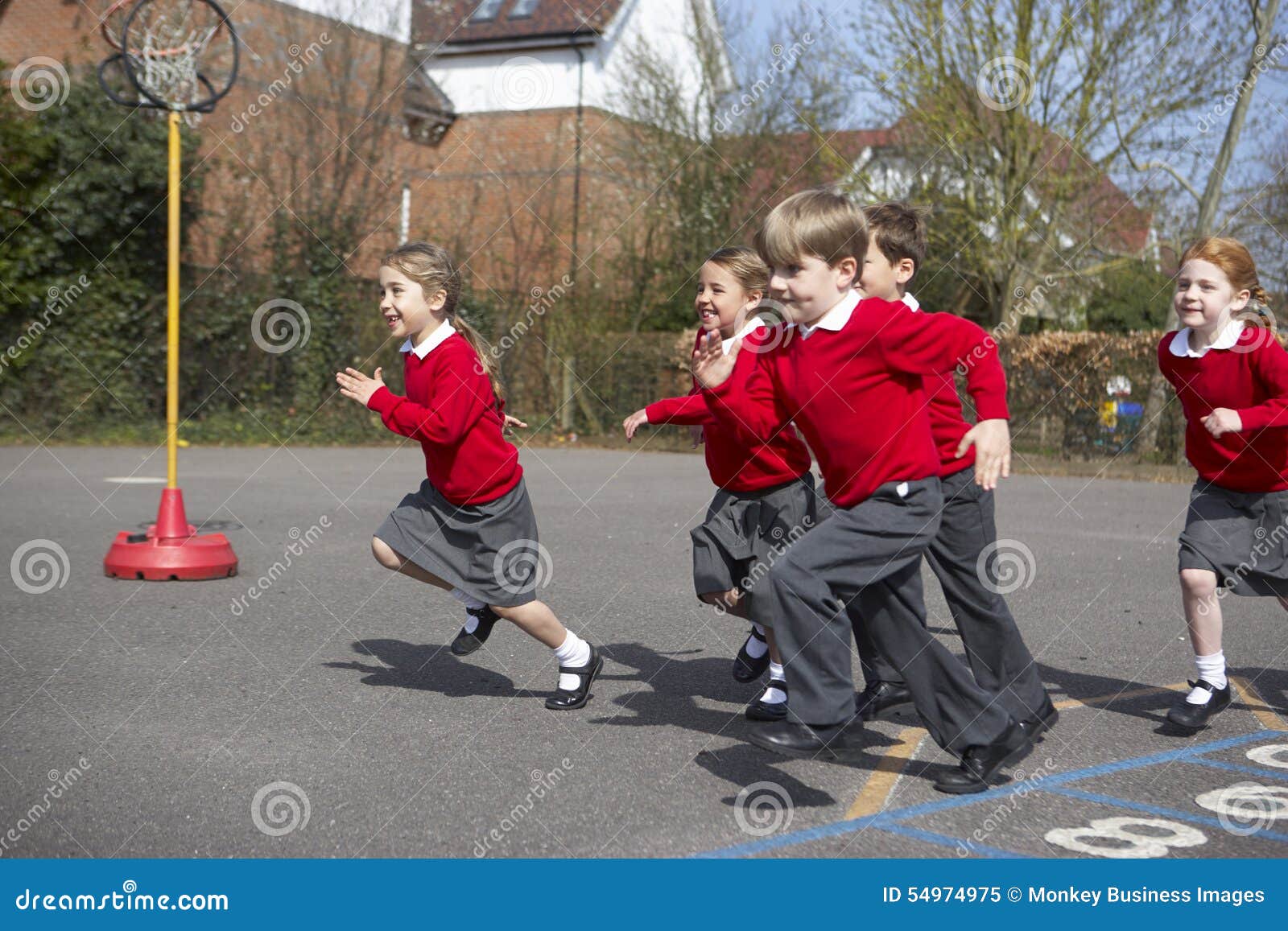 Group of Elementary School Pupils Running in Playground Stock Image ...