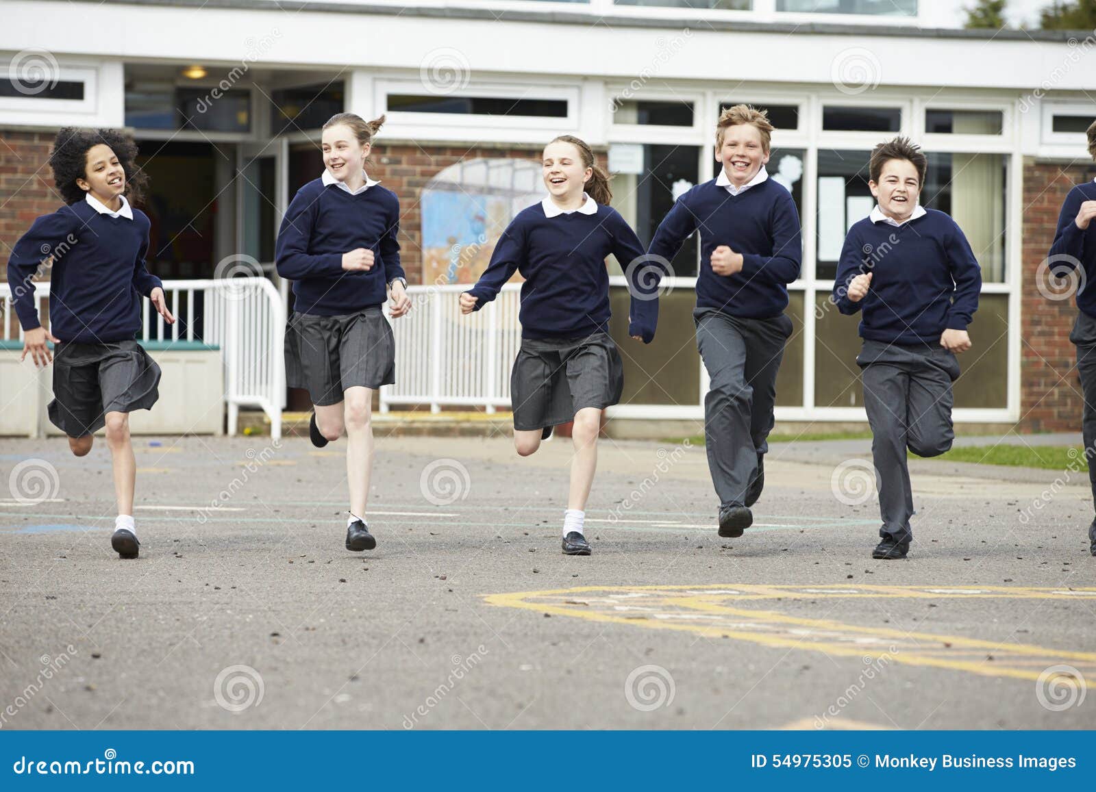 Group of Elementary School Pupils Running in Playground Stock Image ...