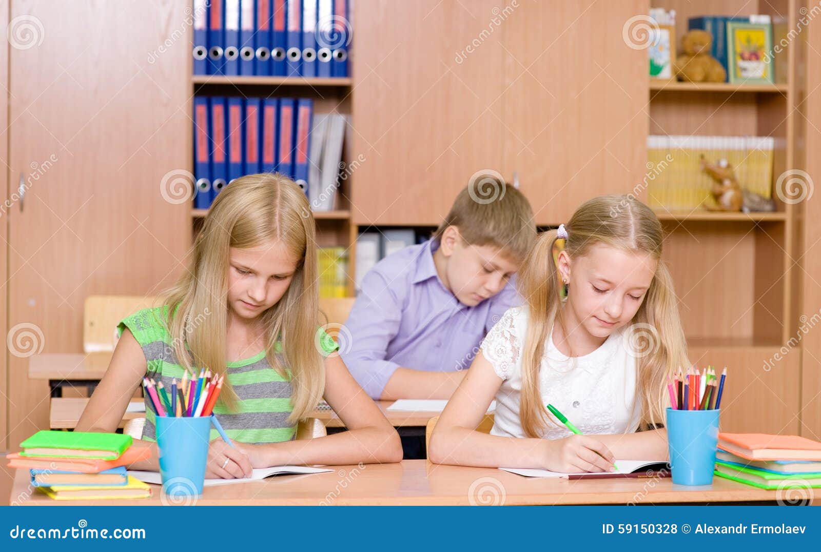 Group of Elementary School Pupils Takes the Test in Classroom Stock ...