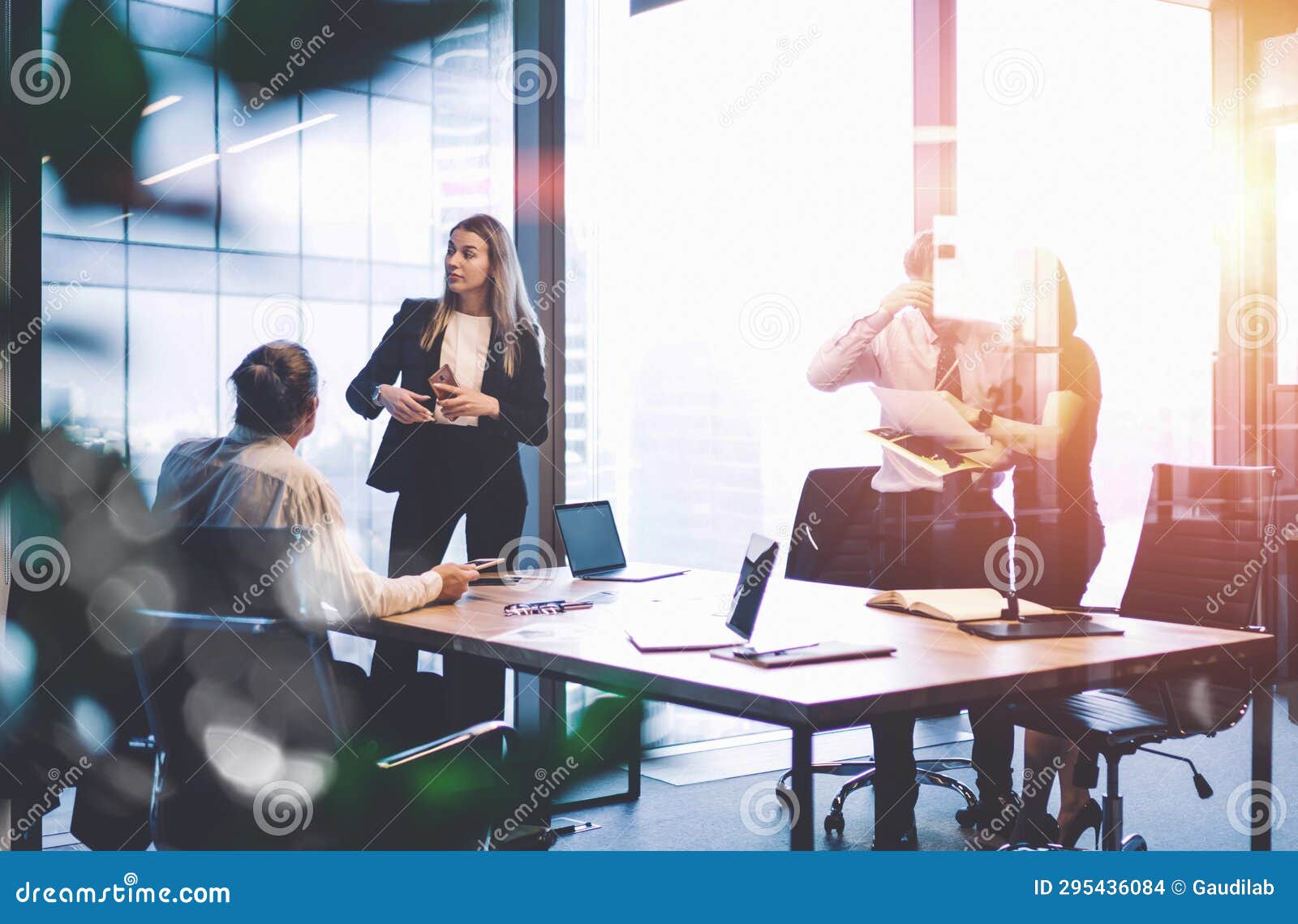 Group of Employees Cooperating and Collaborating in Conference Room of ...