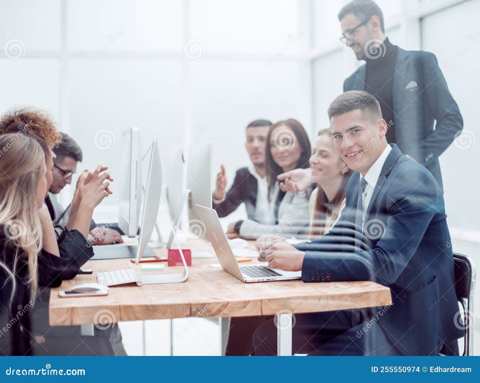 Group Employees Discuss Information Coming into the Office. Stock Photo ...