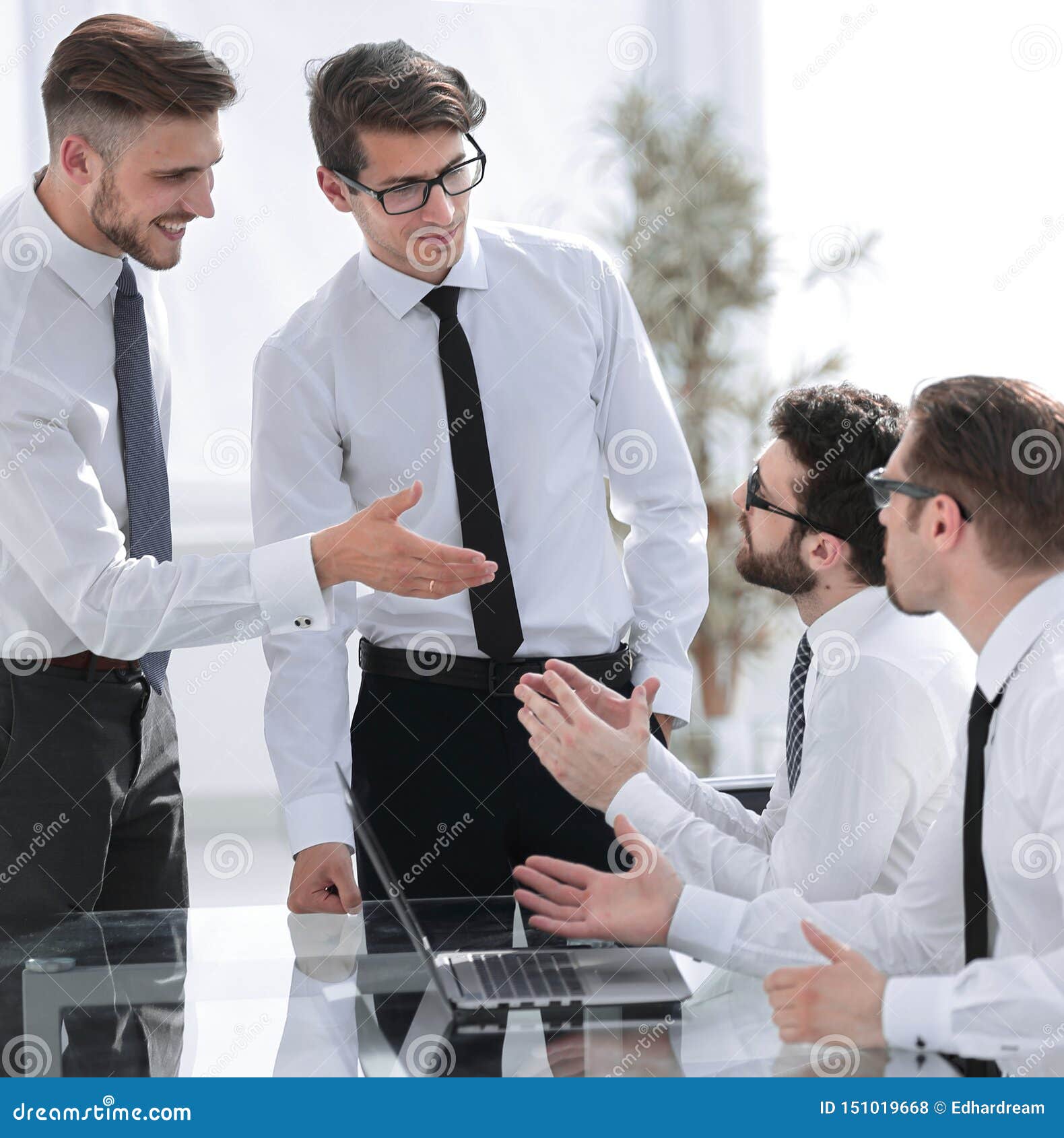 Group of Employees Discussing Ideas for a New Project Stock Photo ...