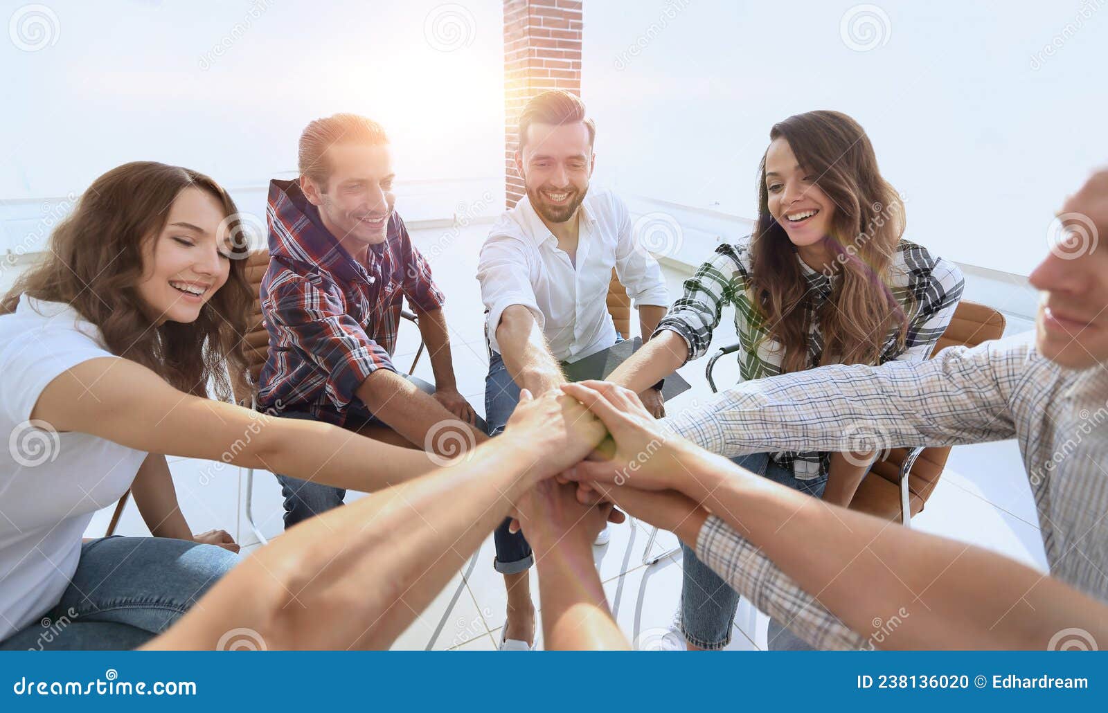 Group of Employees with Hands Clasped Together. Stock Photo - Image of ...