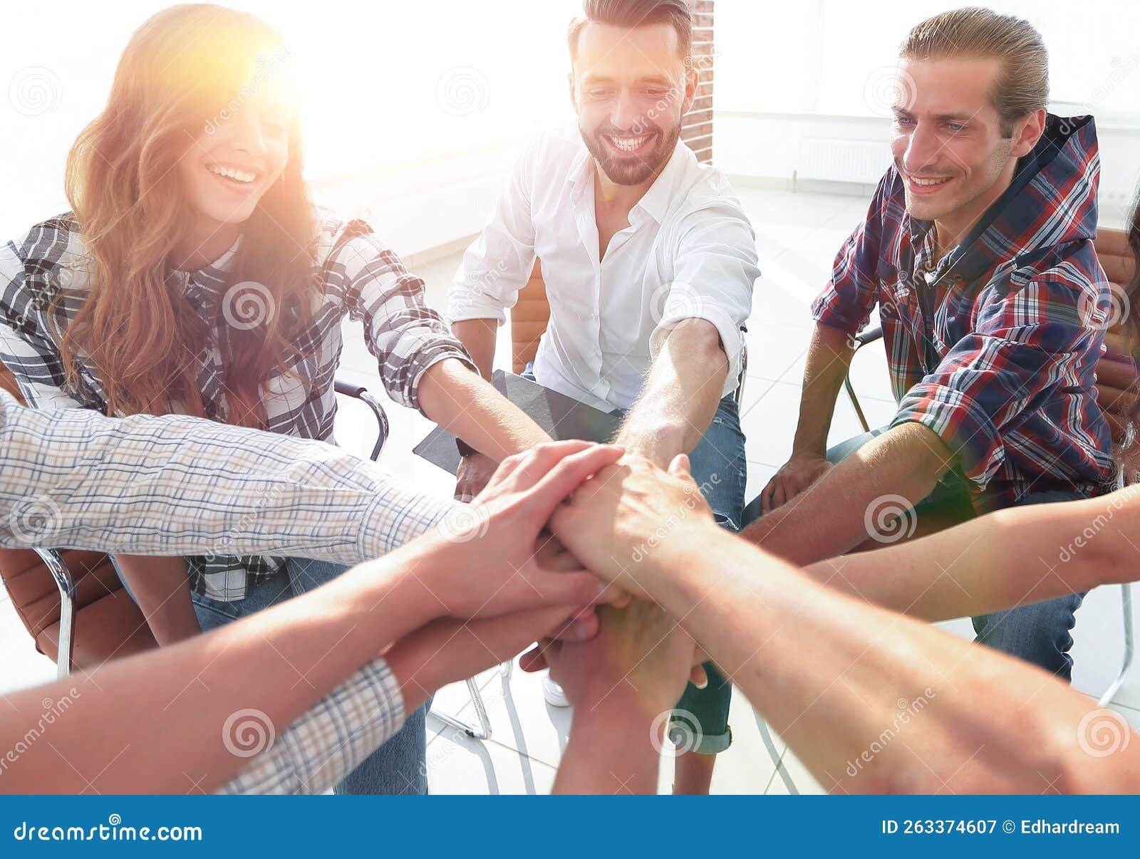 Group of Employees with Hands Clasped Together. Stock Image - Image of ...