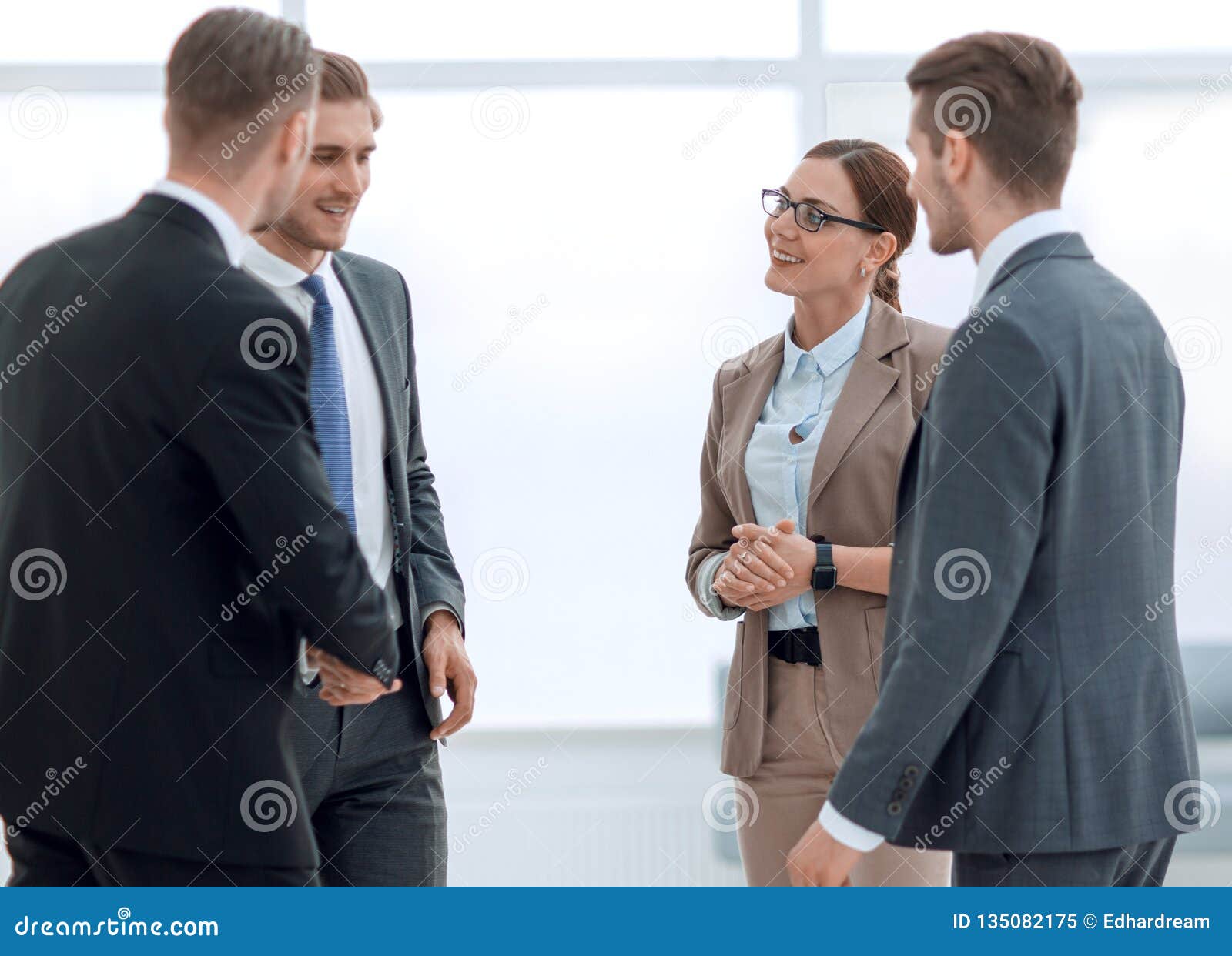 Group of Employees Talking while Standing in the Office Stock Image ...