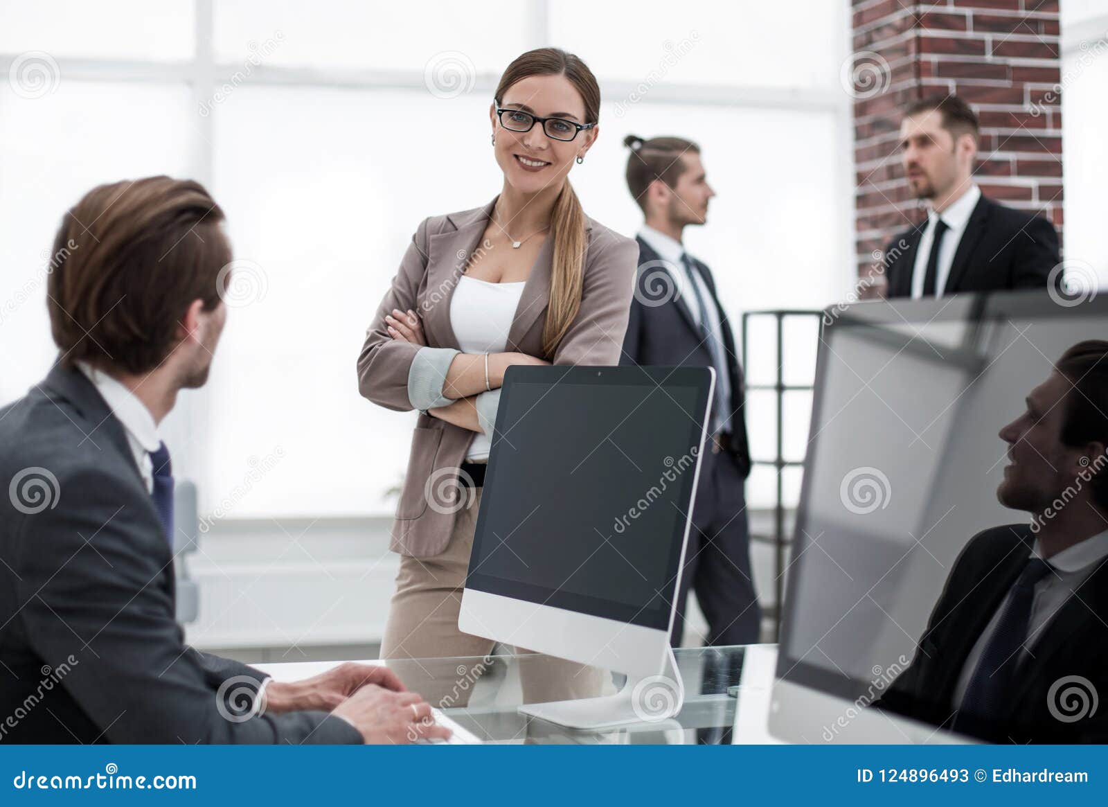 Group of Employees in the Workplace in the Offic Stock Image - Image of ...