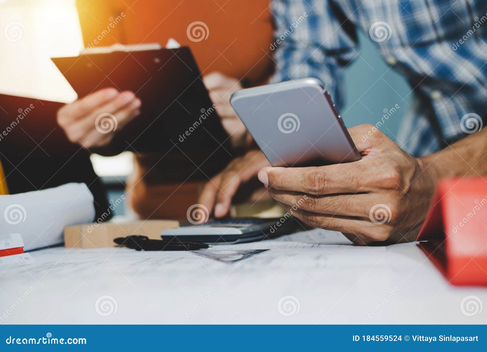Group of Engineer and Architect Working on Digital Mobile Phone and ...