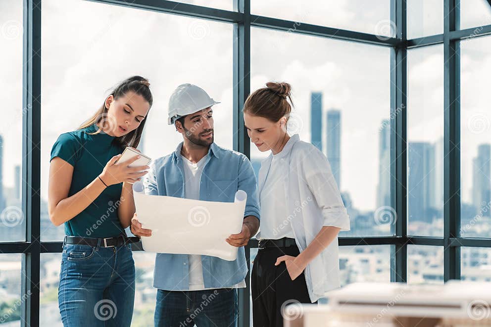Group of Engineer Looking at Project Plan while Brainstorming Idea. Tracery. Stock Photo - Image ...